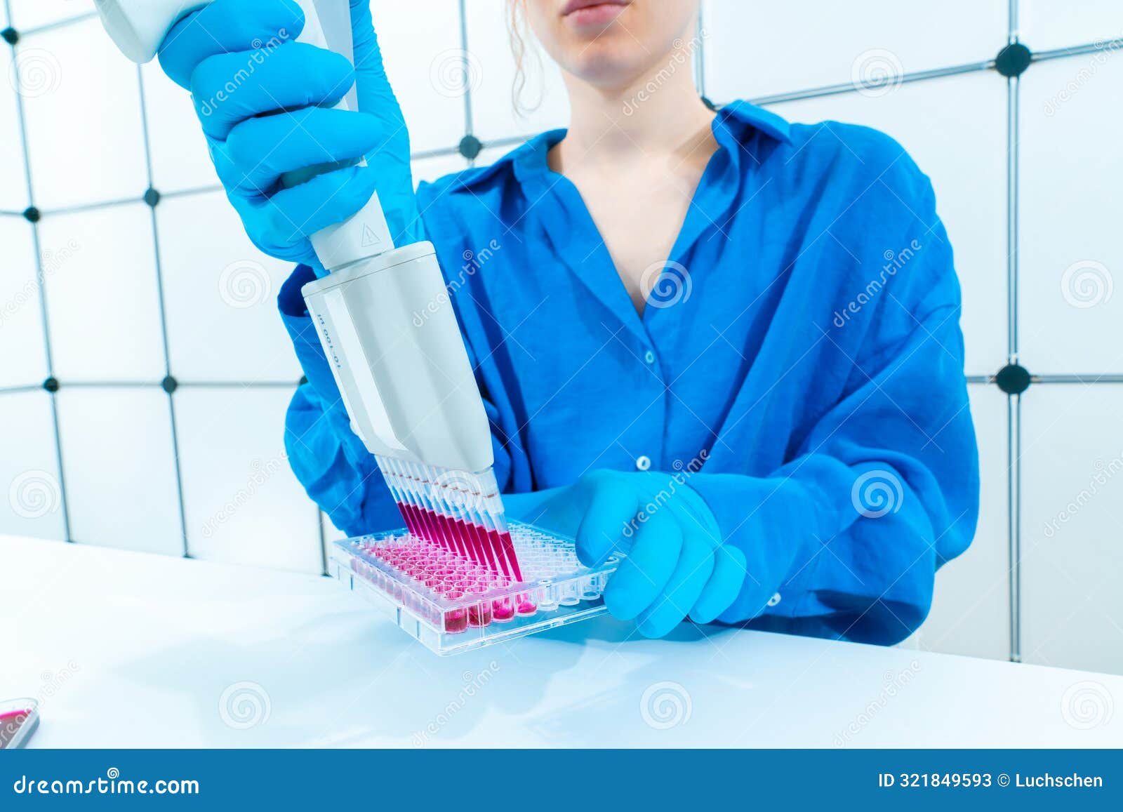 Female Laboratory Assistant in Genetics Laboratory Working with Multi ...