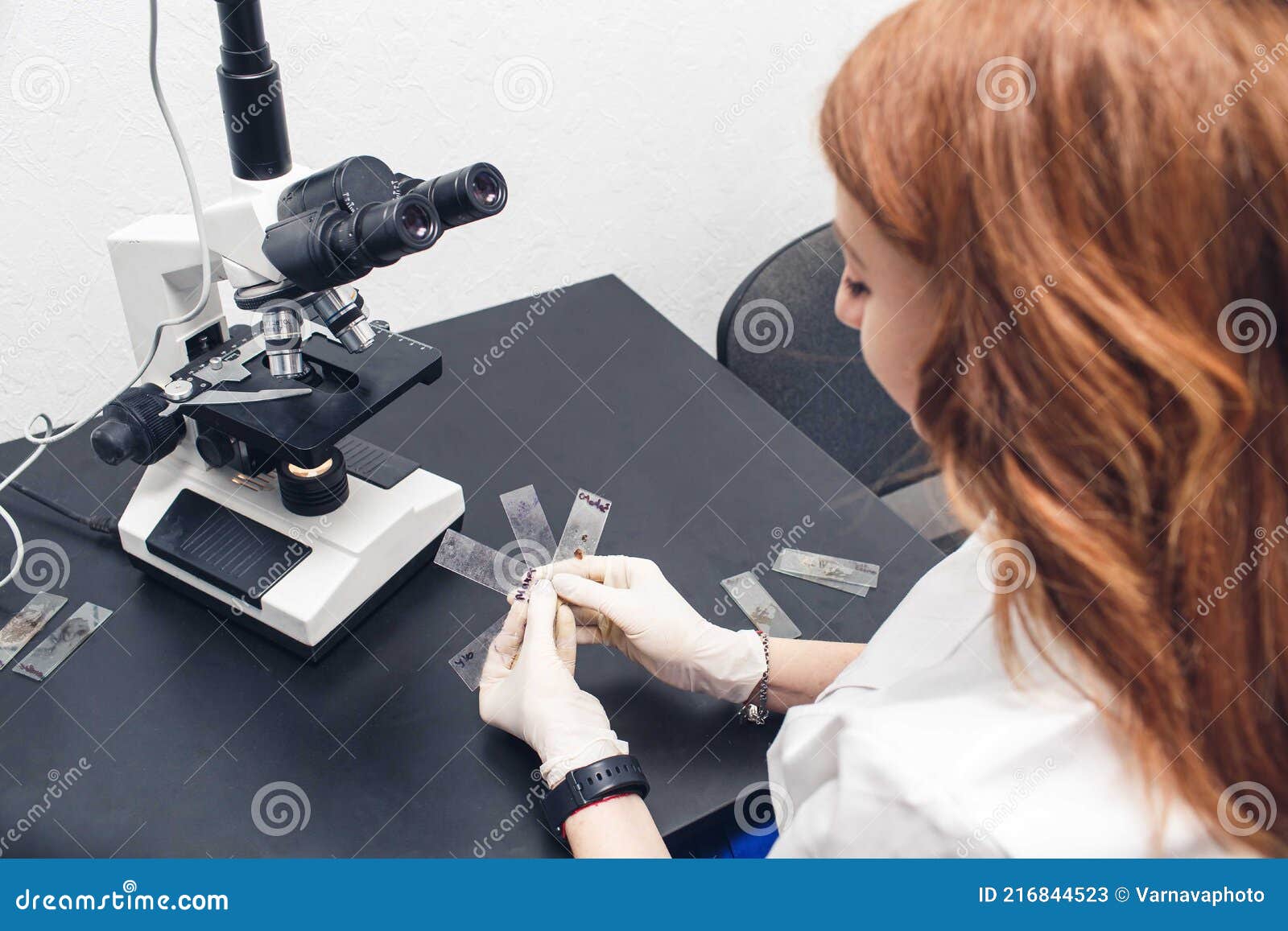 Female Laboratory Assistant Shows the Test Samples Stock Image - Image ...