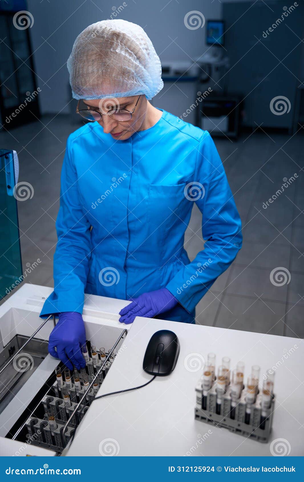 Female Laboratory Assistant Works with Blood Samples in the Laboratory ...