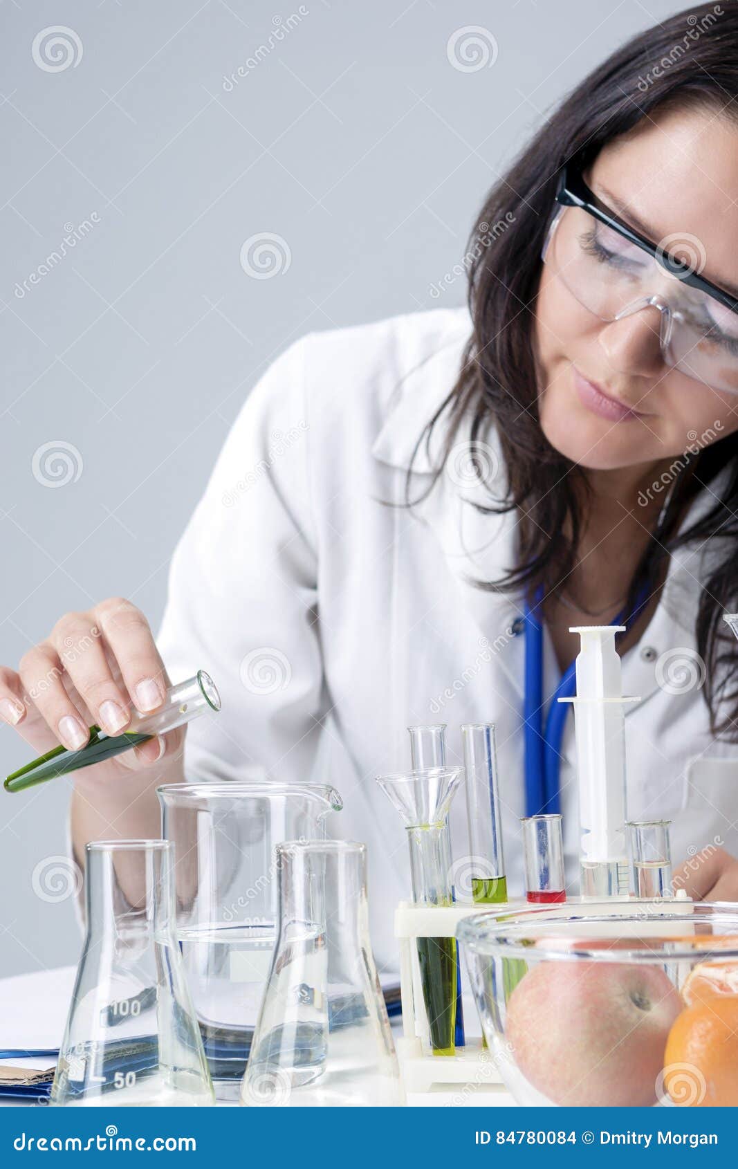 Female Laboratory Staff Working with Flasks Filled with Liquids Stock ...