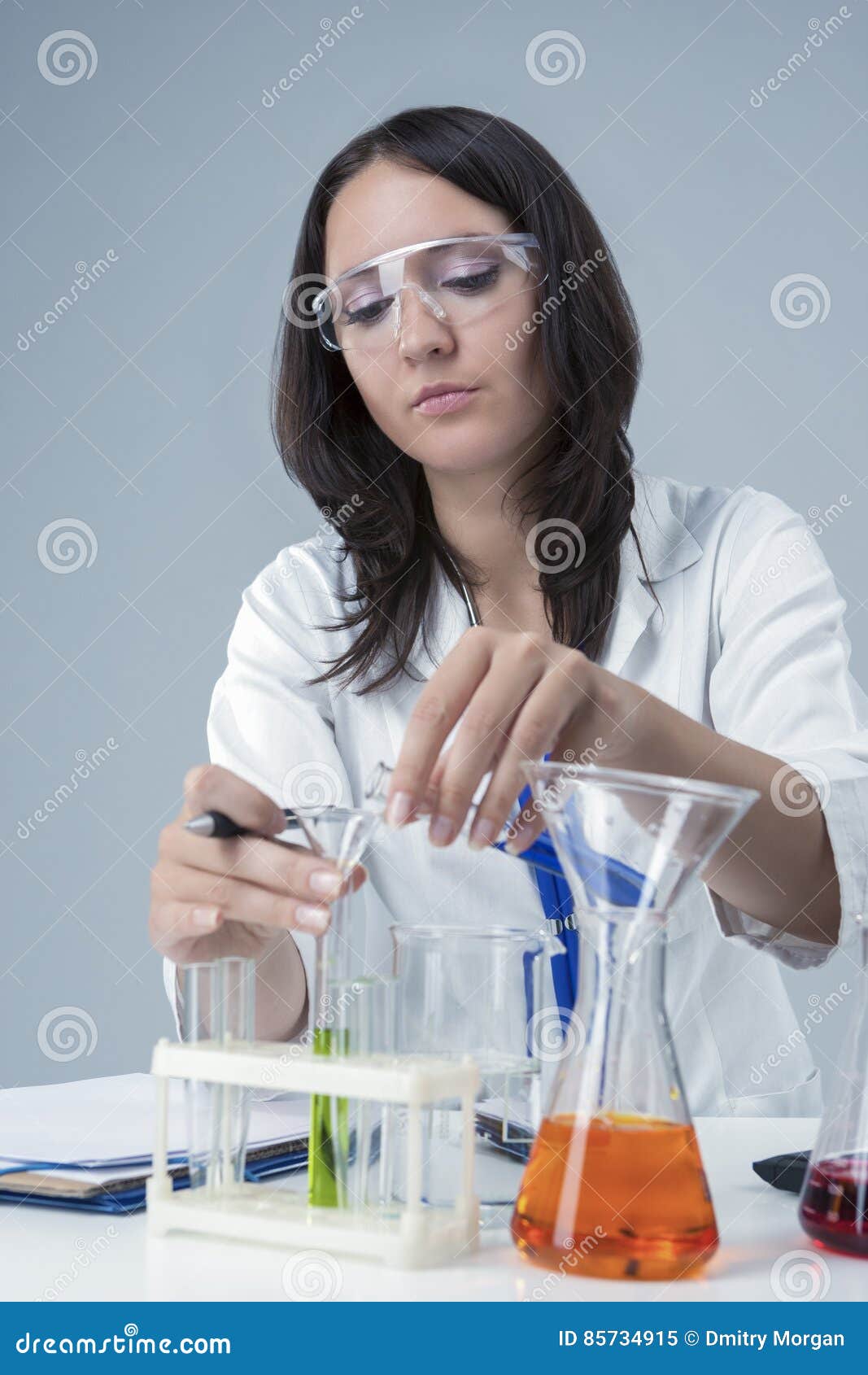 Female Laboratory Staff Working with Liquids in Flasks Stock Image ...