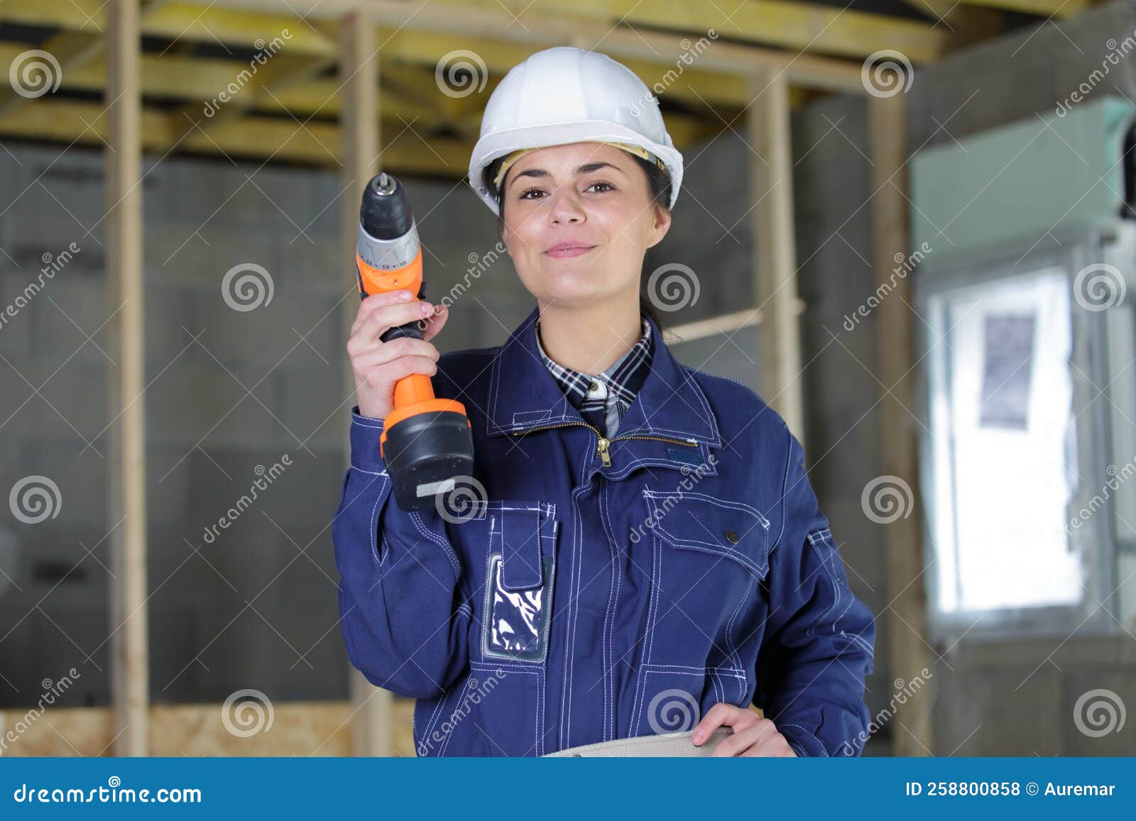 Female Laborer Holding Drilling Machine Stock Photo - Image of ...
