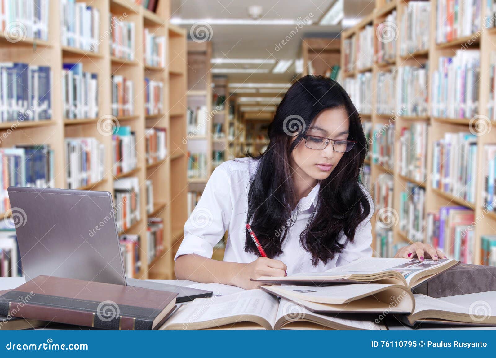 Clever Learner Doing School Task In Library Royalty-Free Stock Image ...