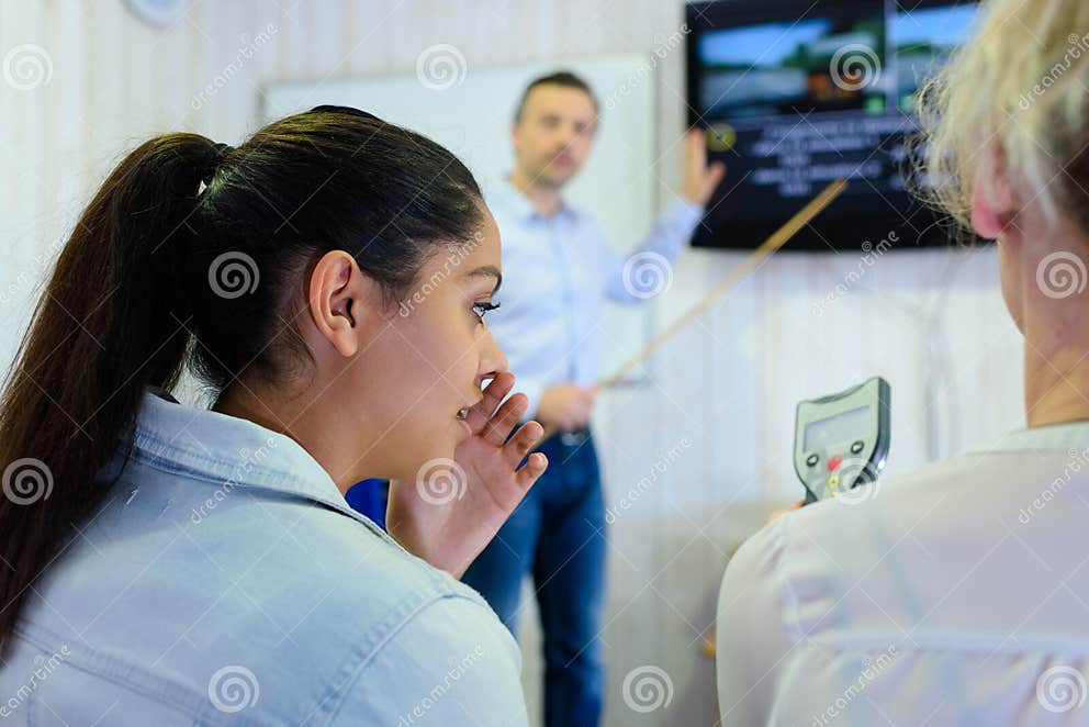 Female Learner Driver in Class Stock Photo - Image of lesson, holding ...