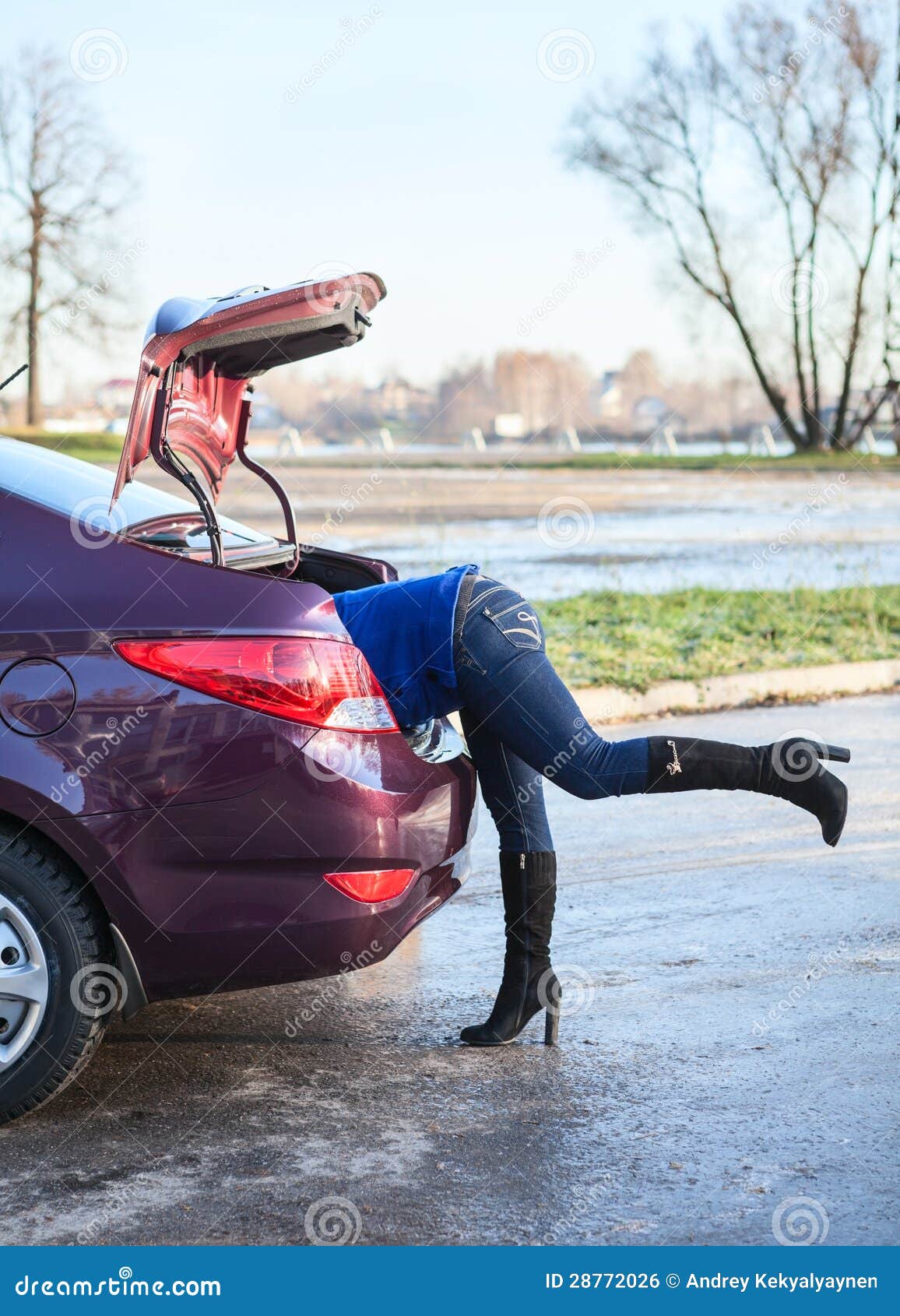 Female legs from car trunk stock photo. Image of funny - 28772026
