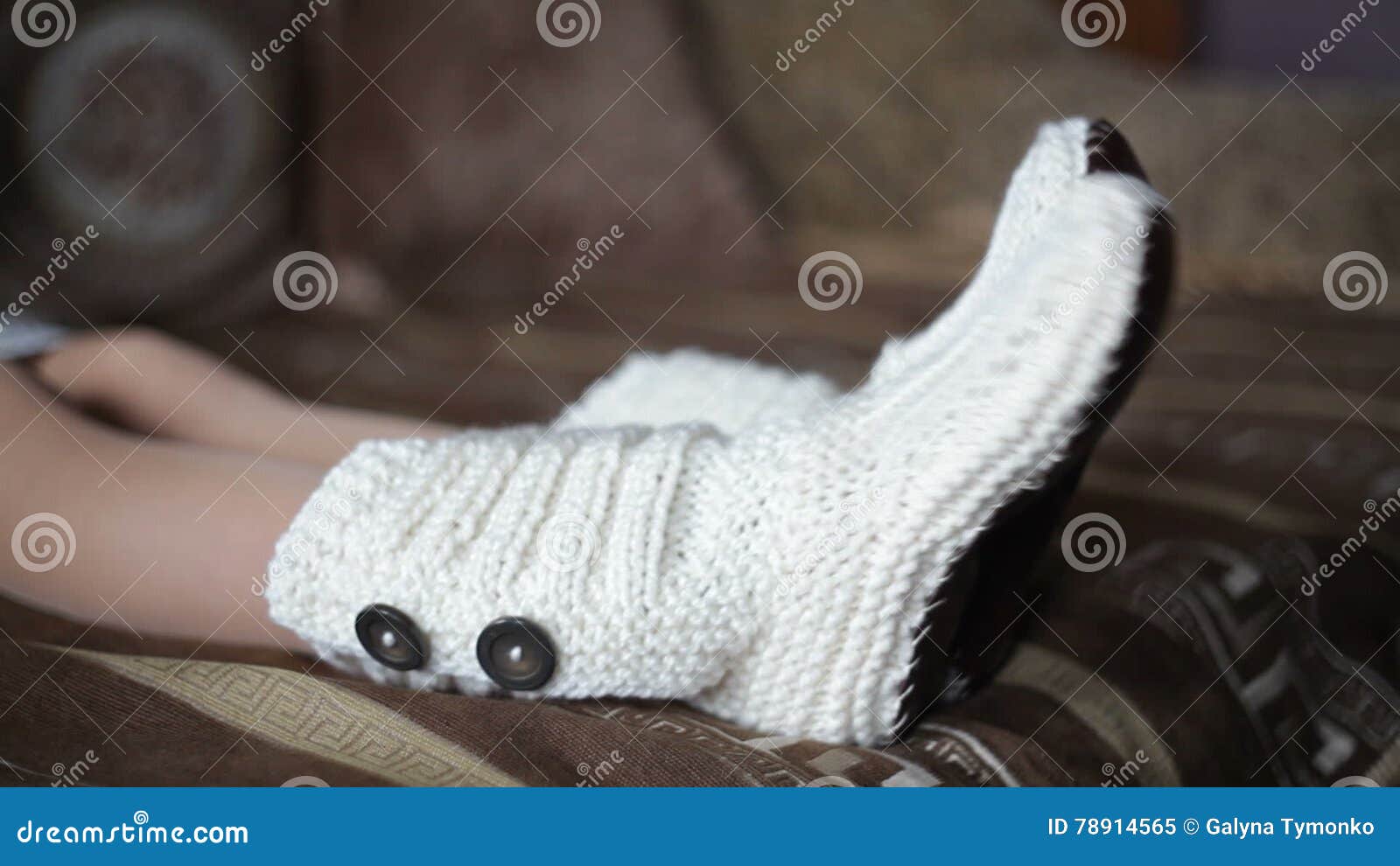 Female Legs in Knitted White Socks on the Couch Stock Video - Video of ...
