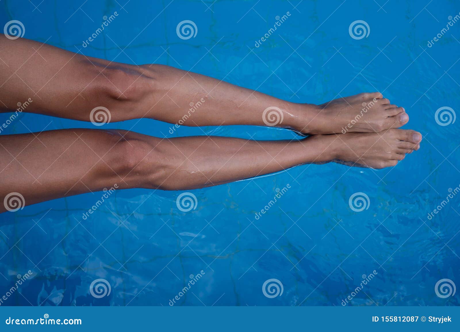 Female Legs in the Pool Water Stock Image - Image of foot, resting ...
