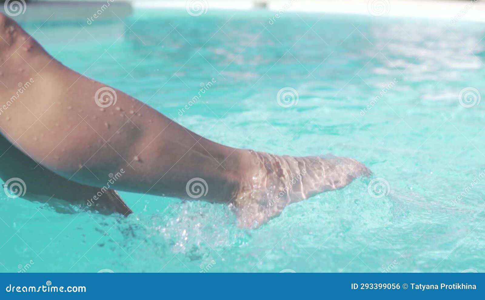 Female Legs Splashing in the Pool, Backlit Bright Light, Glare Stock ...