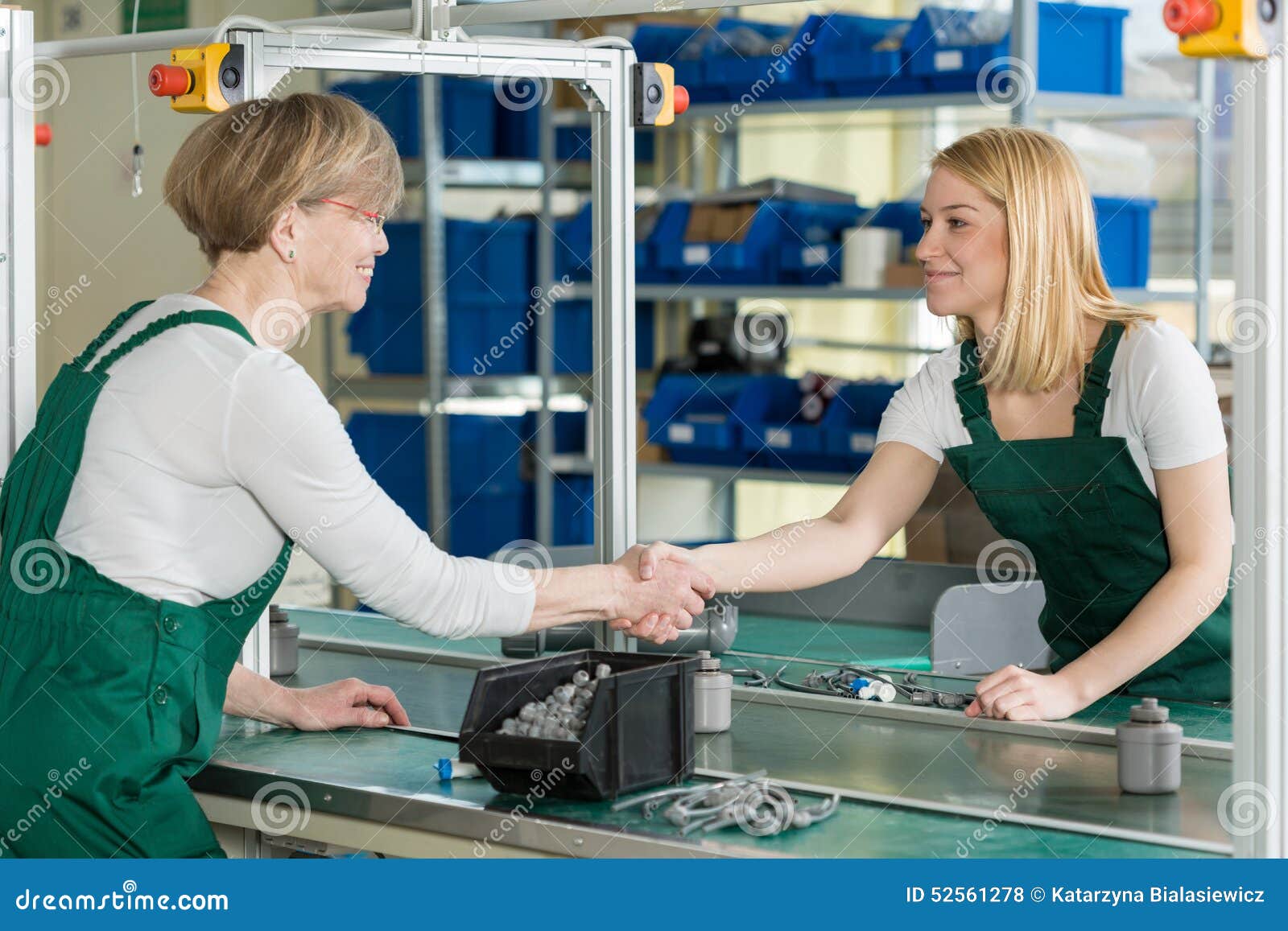 Female line workers stock photo. Image of labor, centre - 52561278