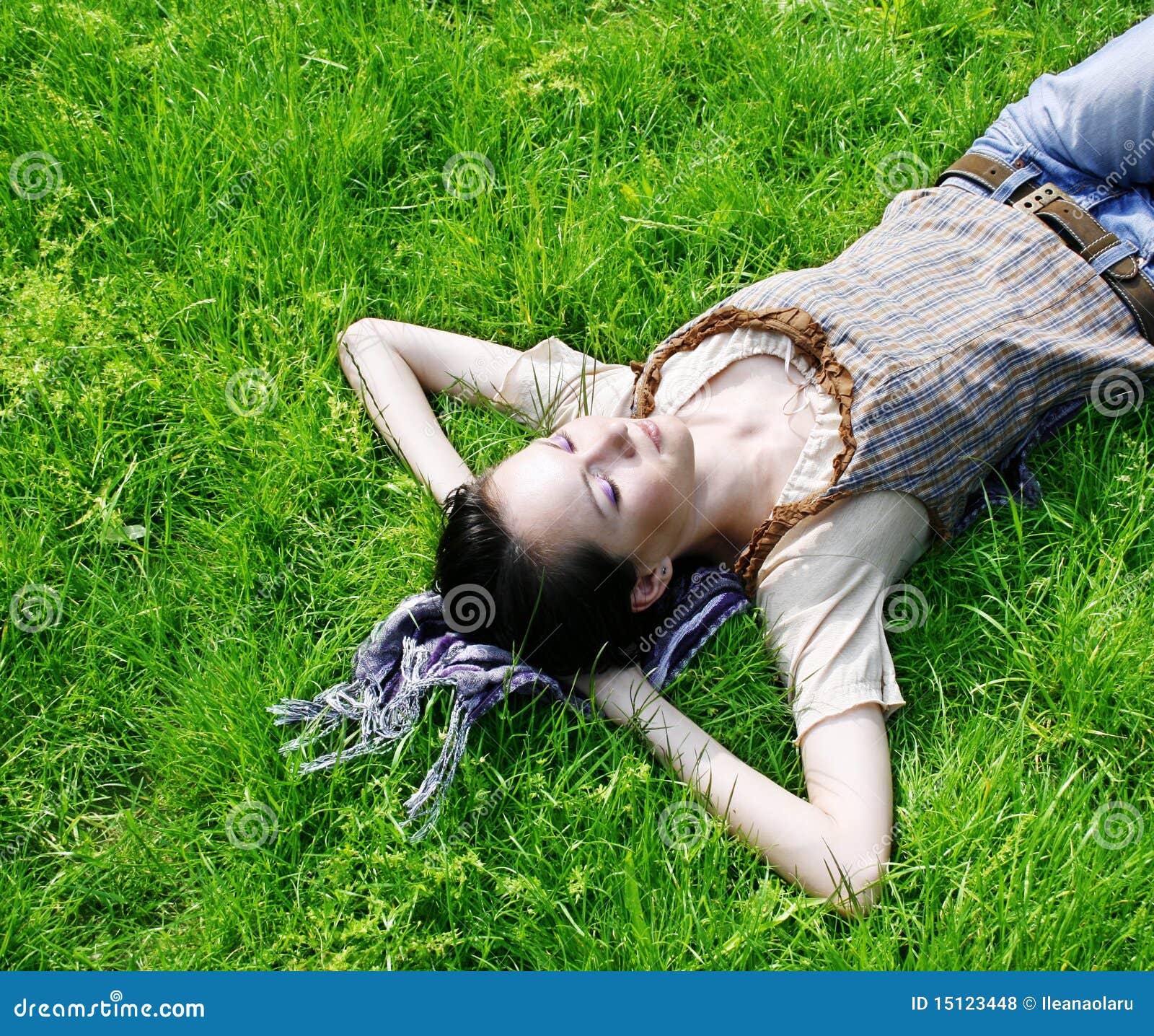 Female lying on the grass stock photo. Image of cheerful - 15123448