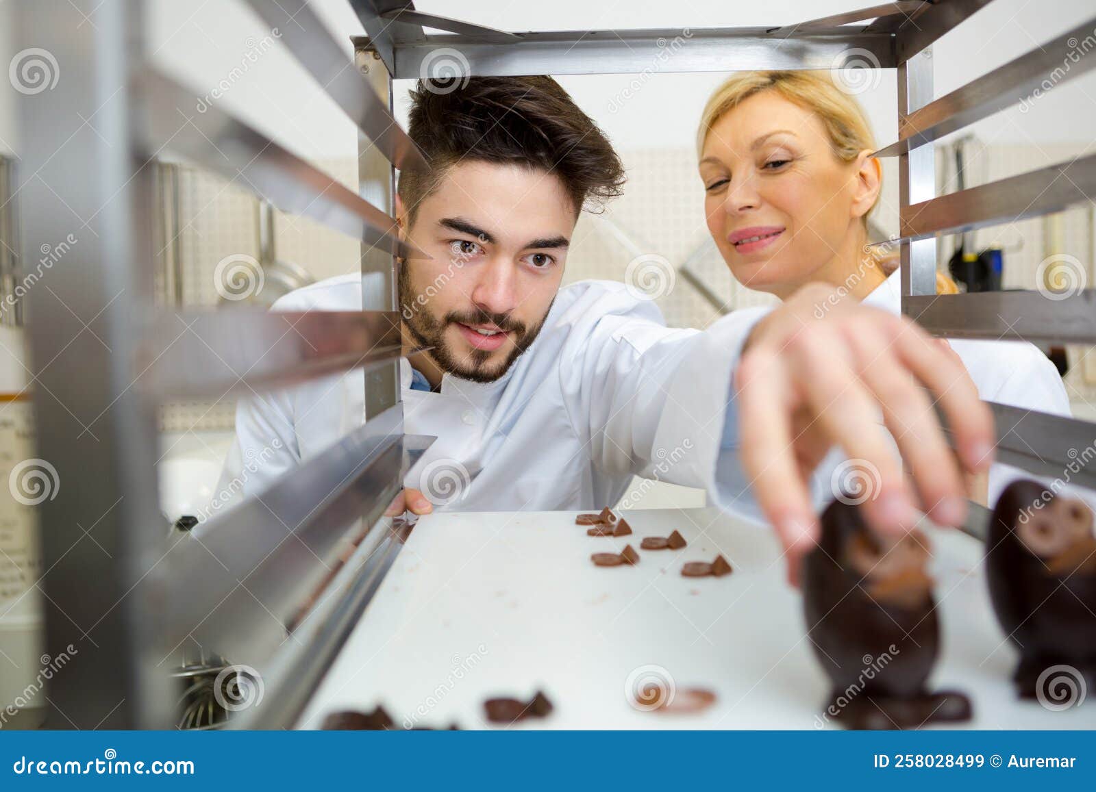 Female and Male Chocolate Maker Stock Image - Image of placement, work ...
