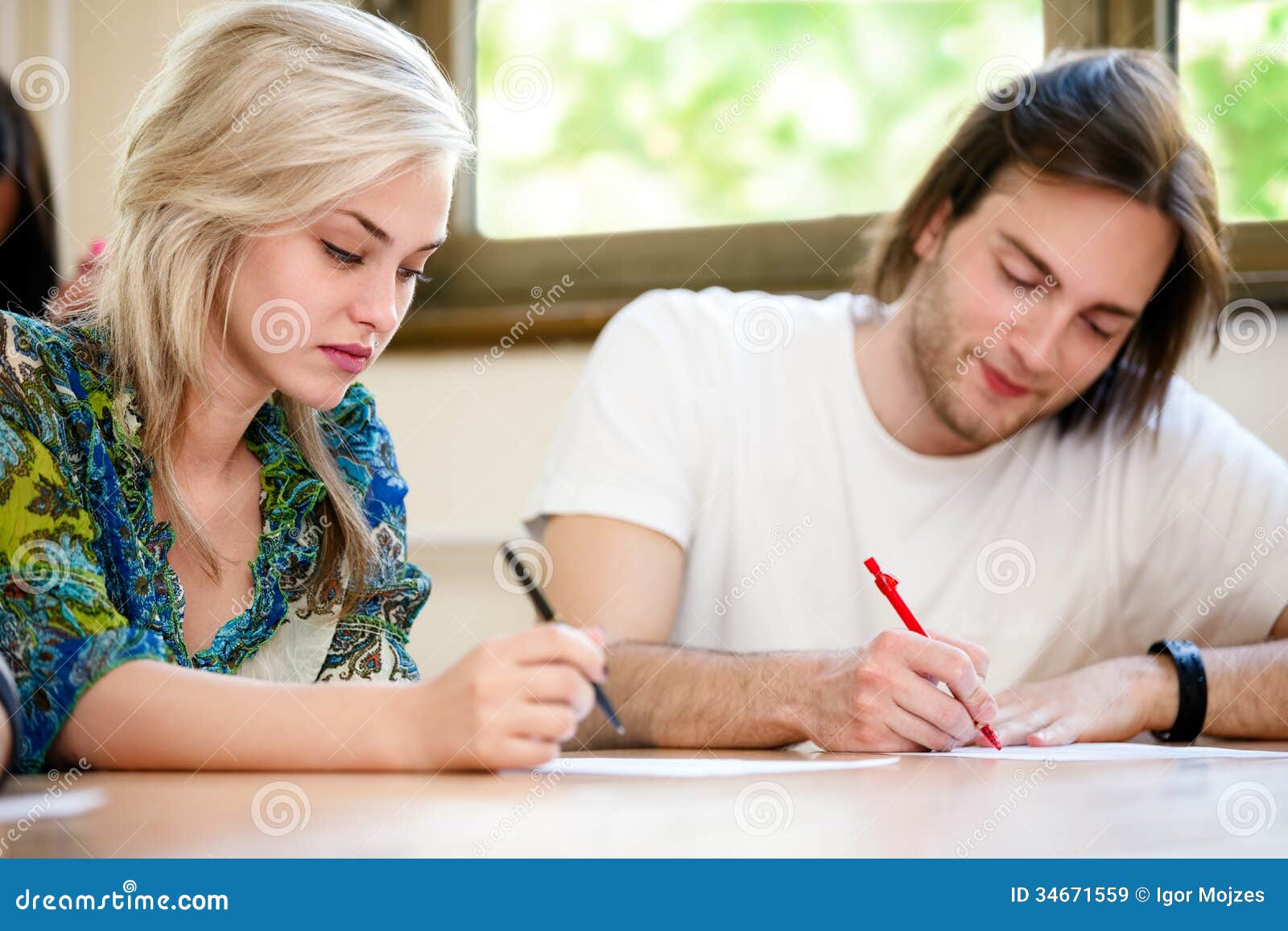 Female and Male Student at Class Stock Image - Image of happy, female ...