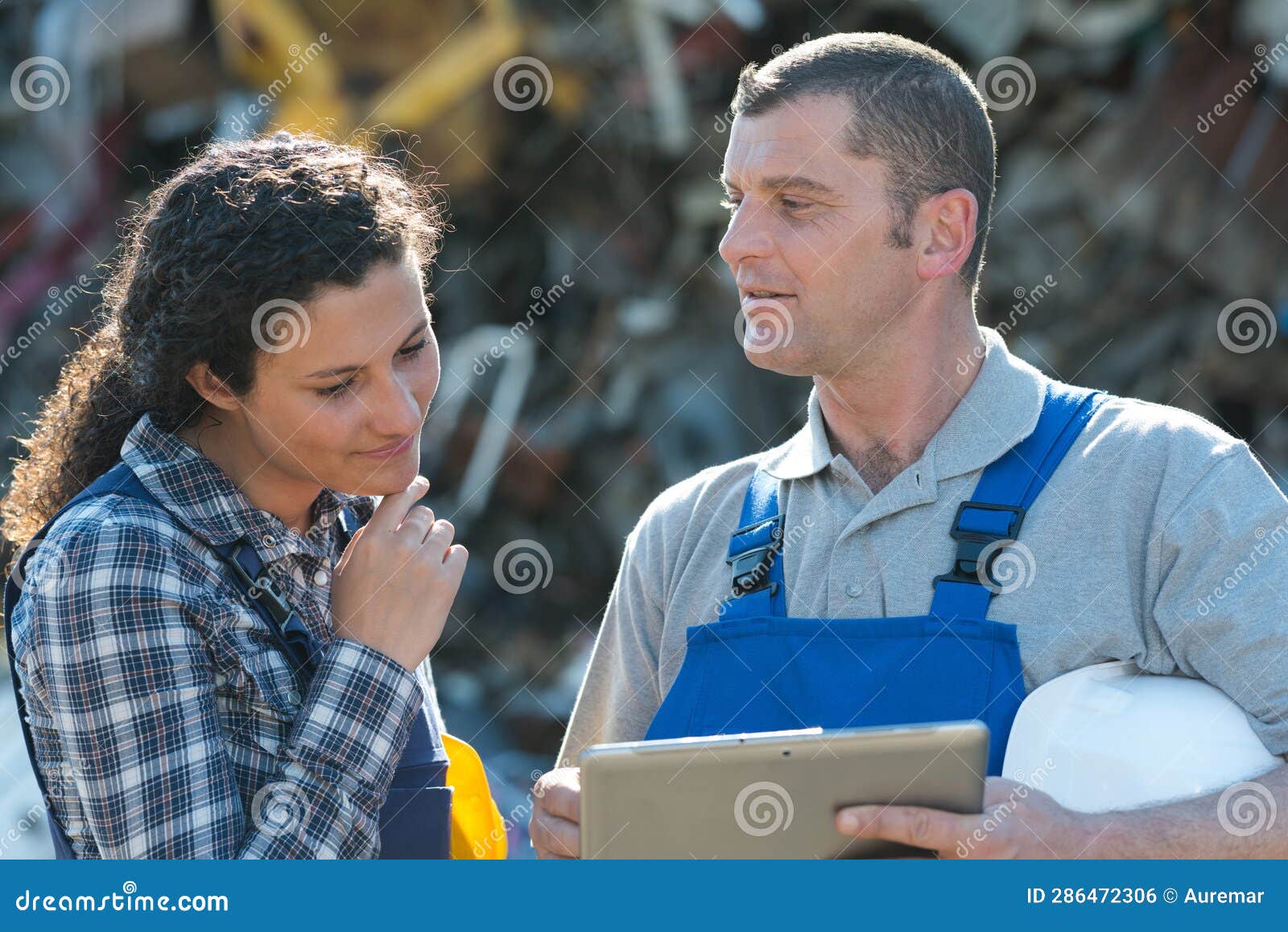 Female and Male Workers on Junkyard Stock Photo - Image of crushed ...