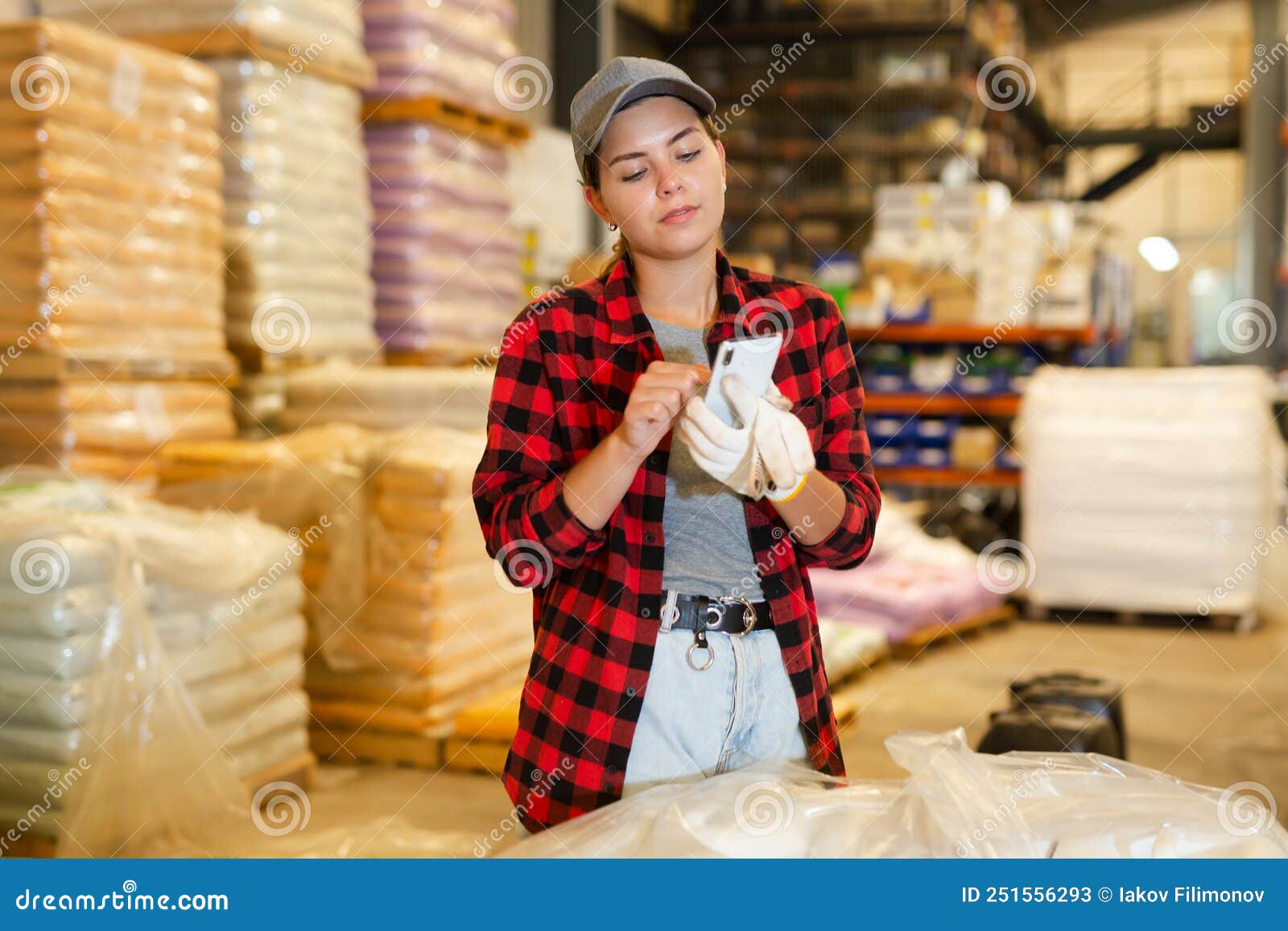 Female Manager Keeps Records of Bulk Construction Materials in the ...