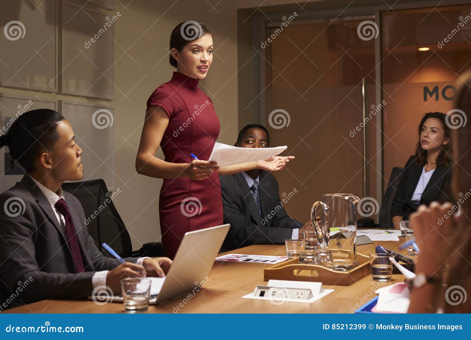 Female Manager Standing with Documents at Business Meeting Stock Image ...