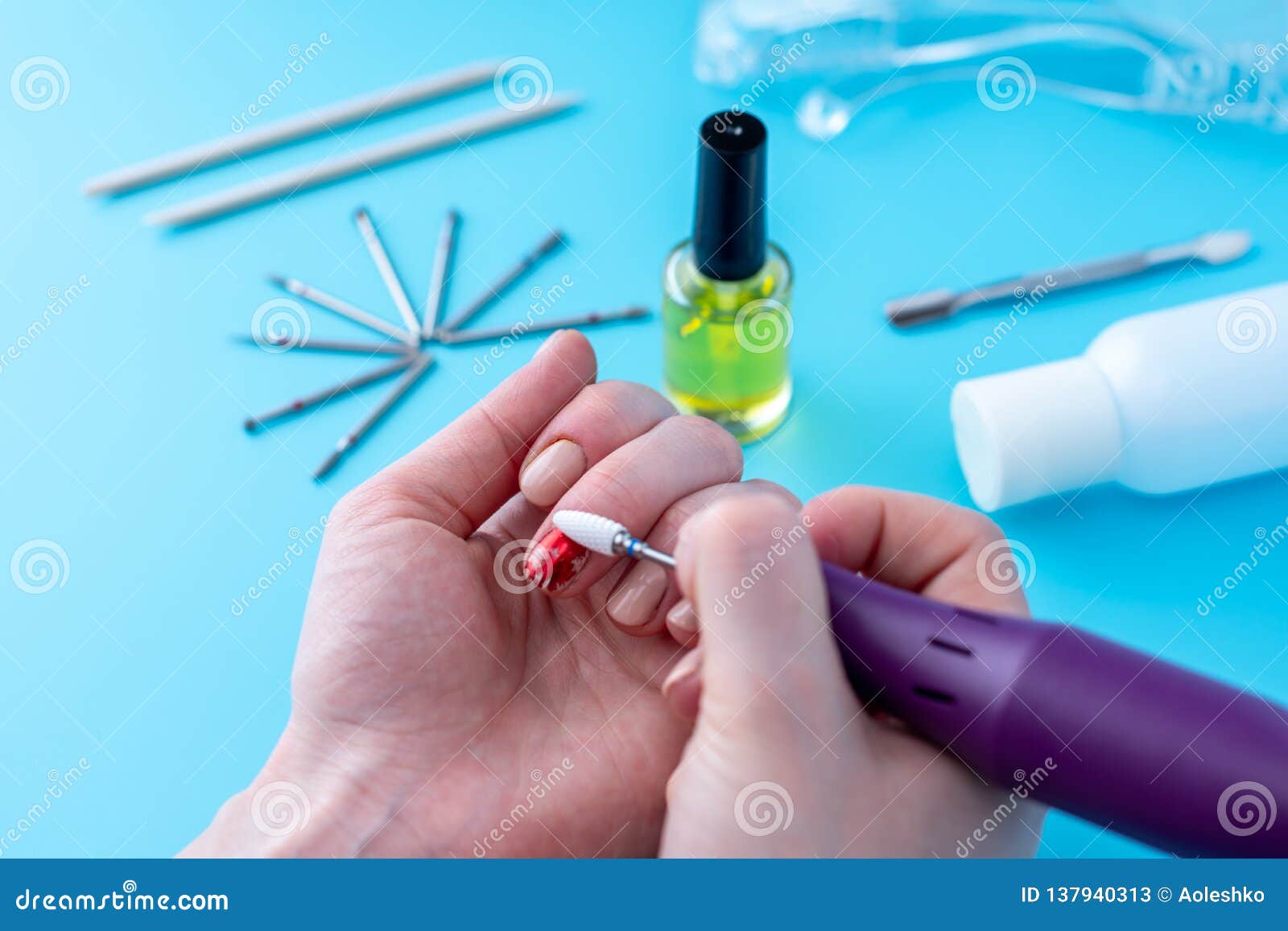 Female Manicurist Doing a Professional Manicure Hardware Using Milling ...