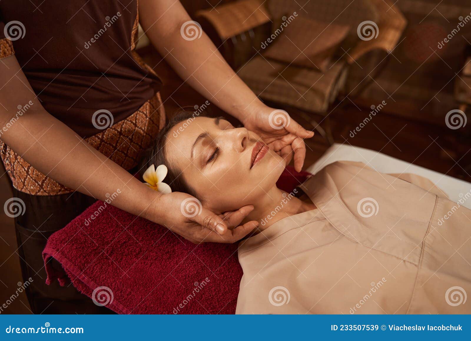 Female Massotherapist Giving Her Client Acupressure Massage Stock Image