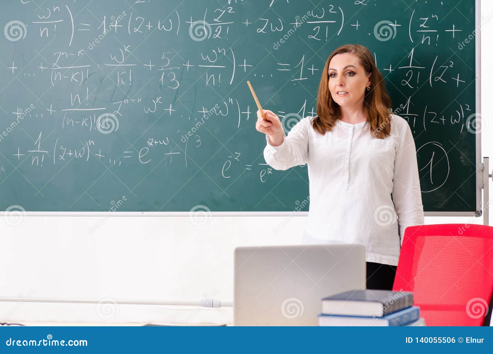 The Female Math Teacher in the Classroom Stock Photo - Image of ...