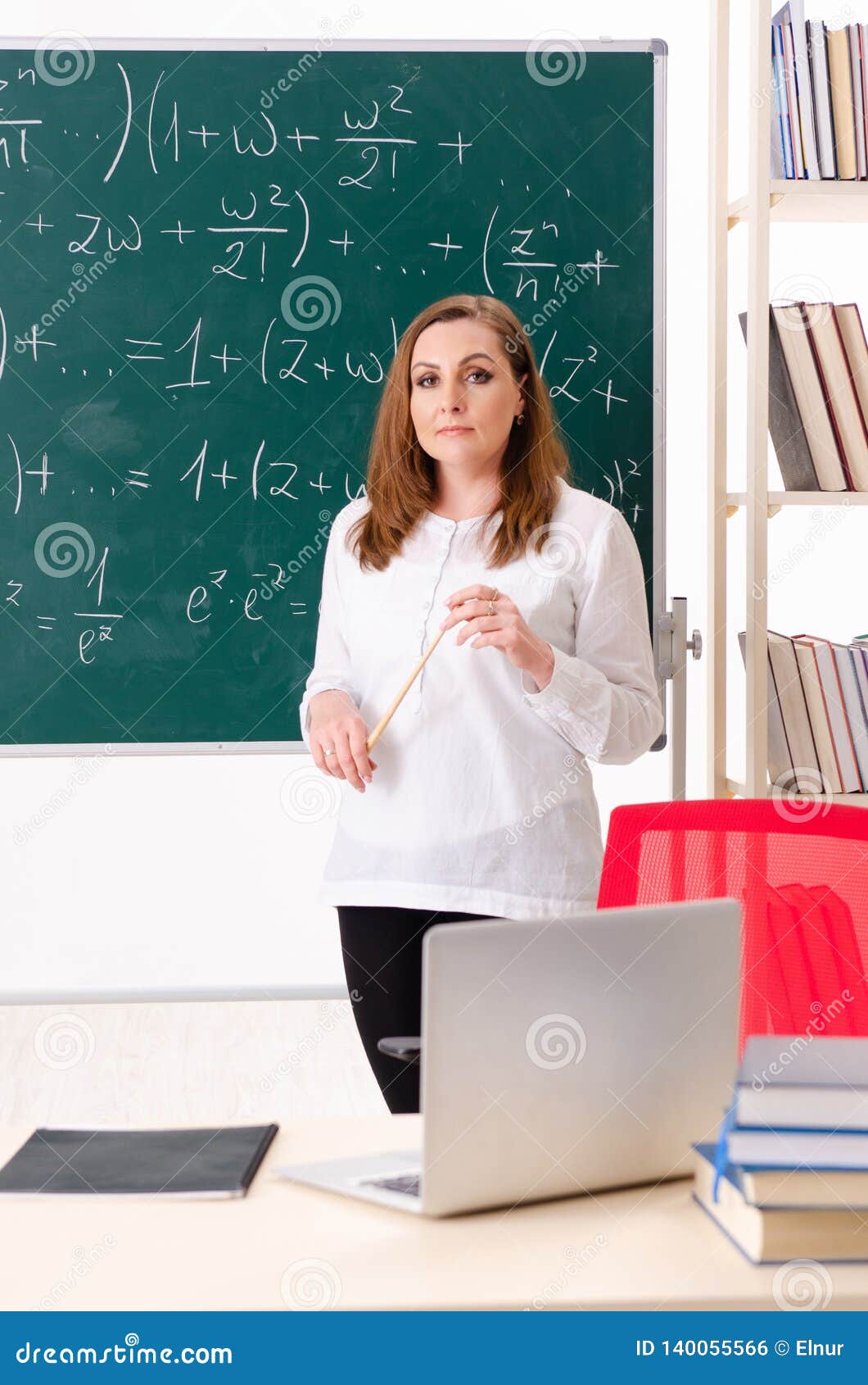The Female Math Teacher in the Classroom Stock Photo - Image of ...