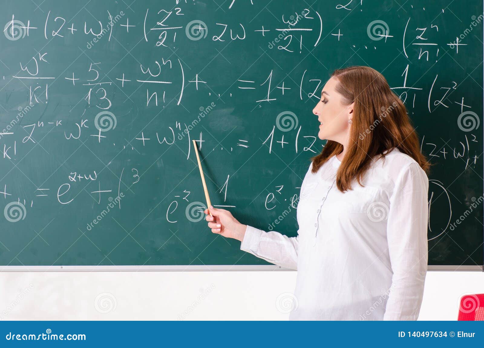 The Female Math Teacher in the Classroom Stock Photo - Image of ...