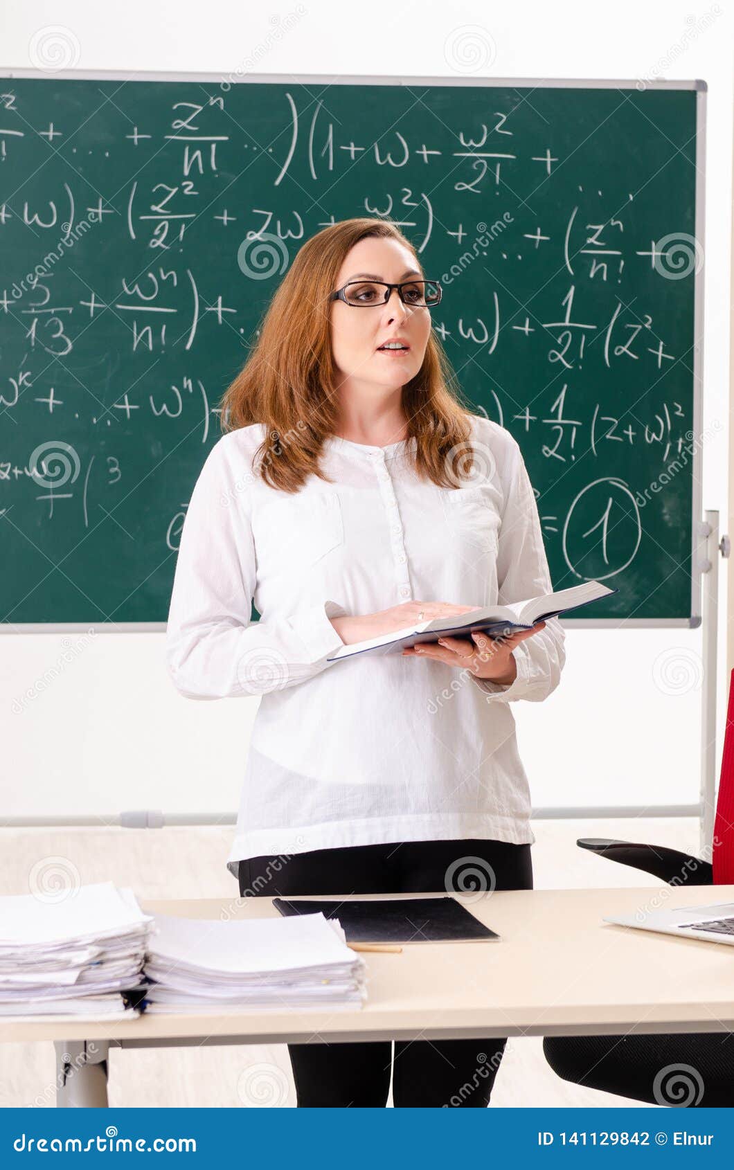 The Female Math Teacher in the Classroom Stock Photo - Image of ...