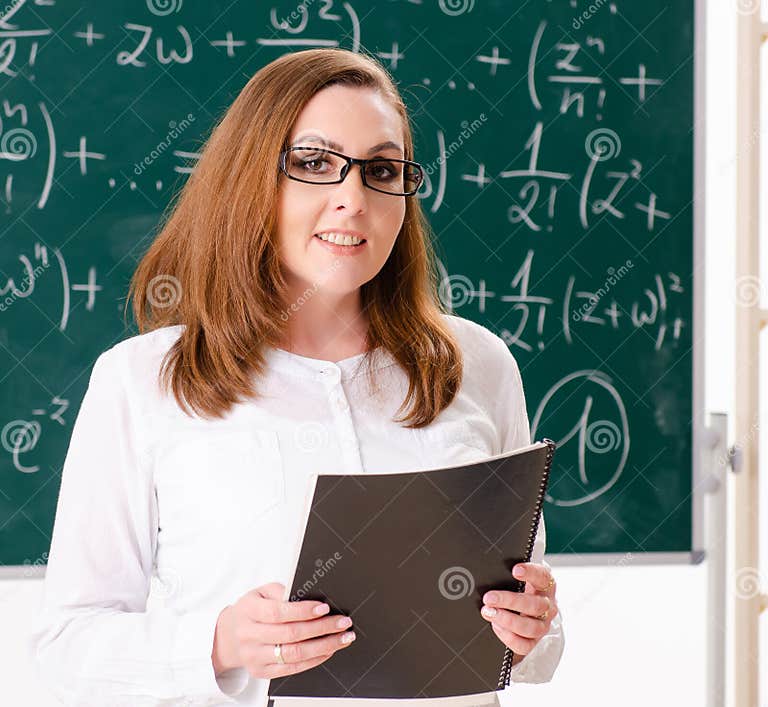 Female Math Teacher in the Classroom Stock Photo - Image of ...
