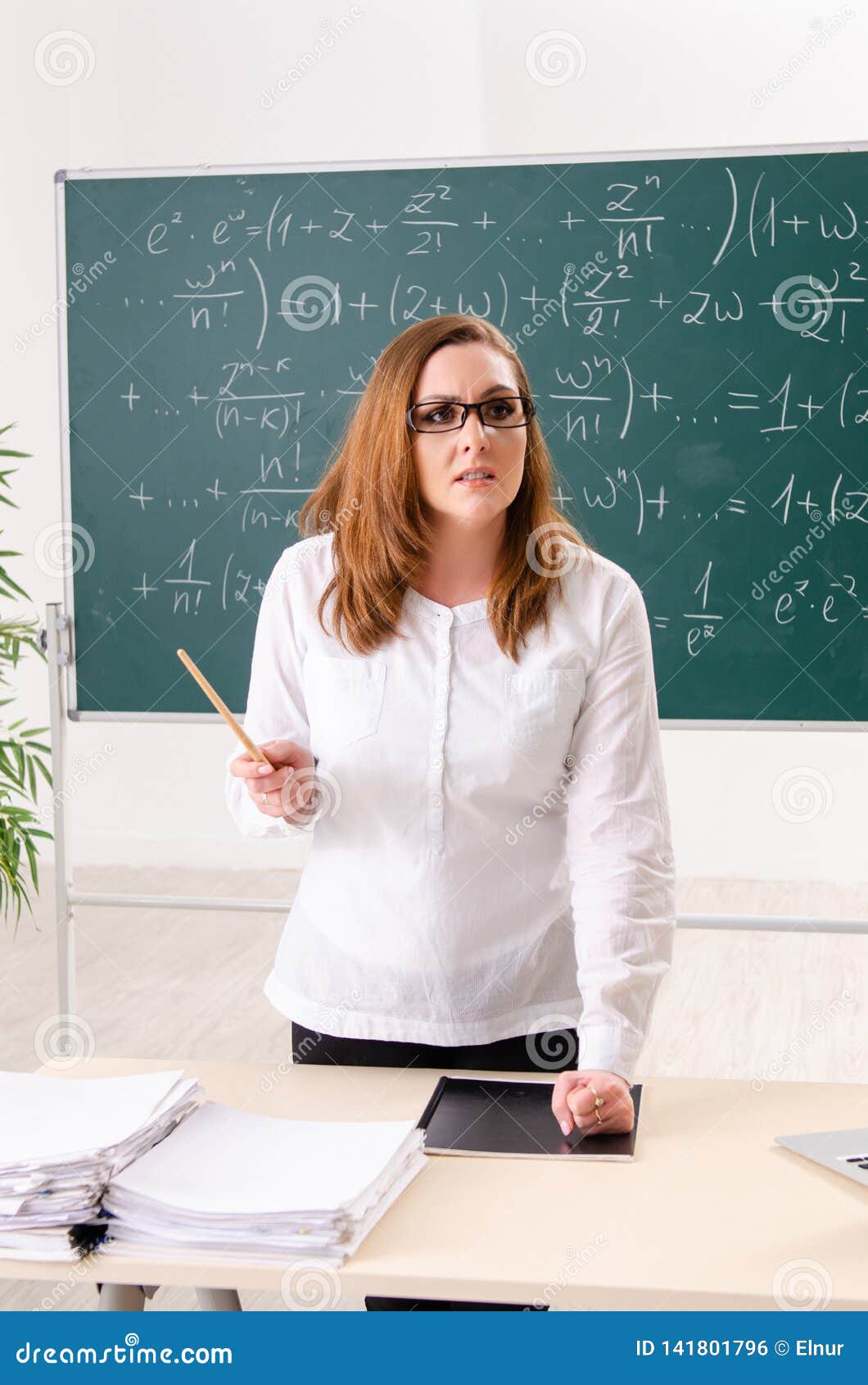 The Female Math Teacher in the Classroom Stock Photo - Image of ...