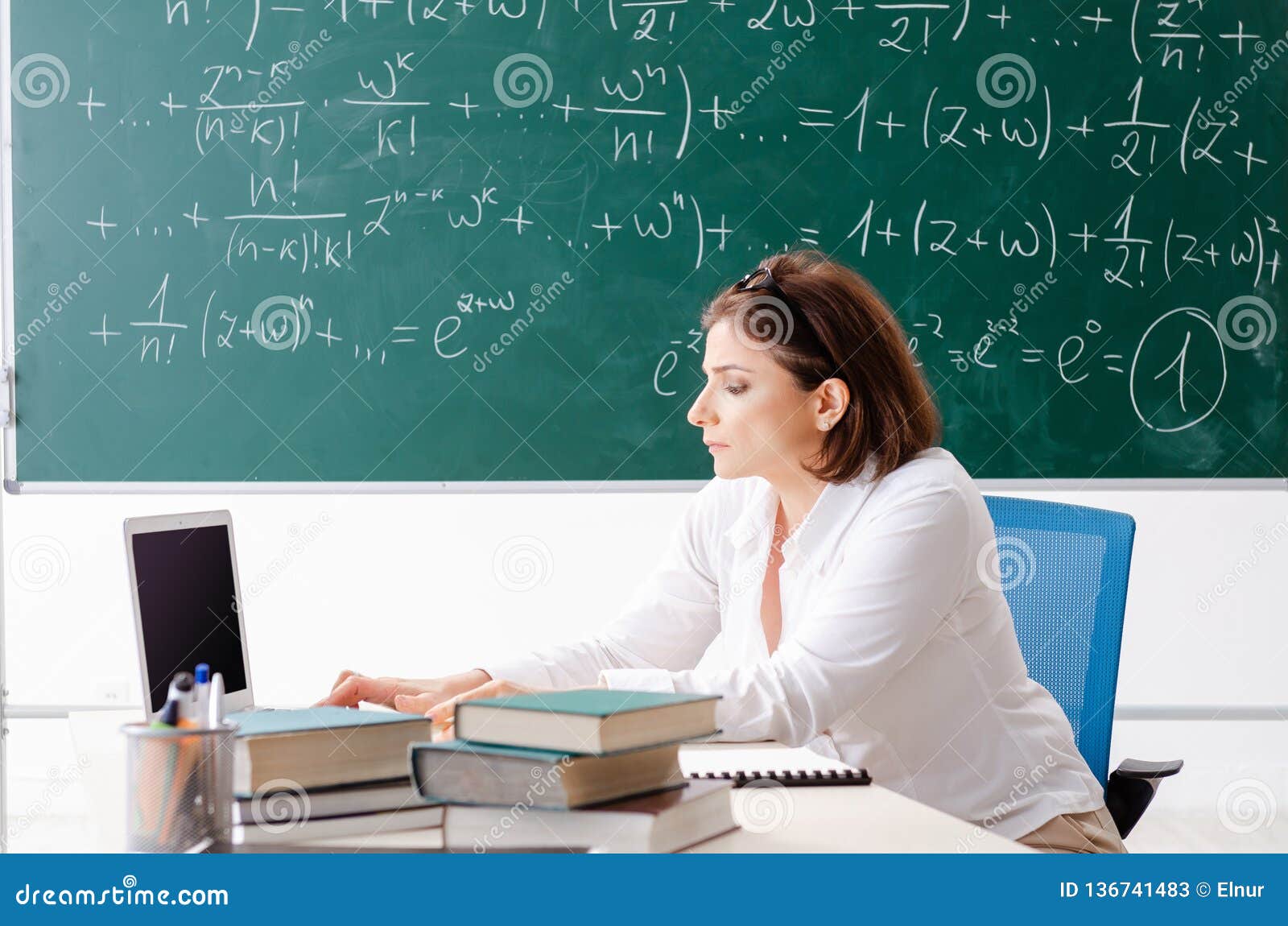 The Female Math Teacher in Front of the Chalkboard Stock Image - Image ...