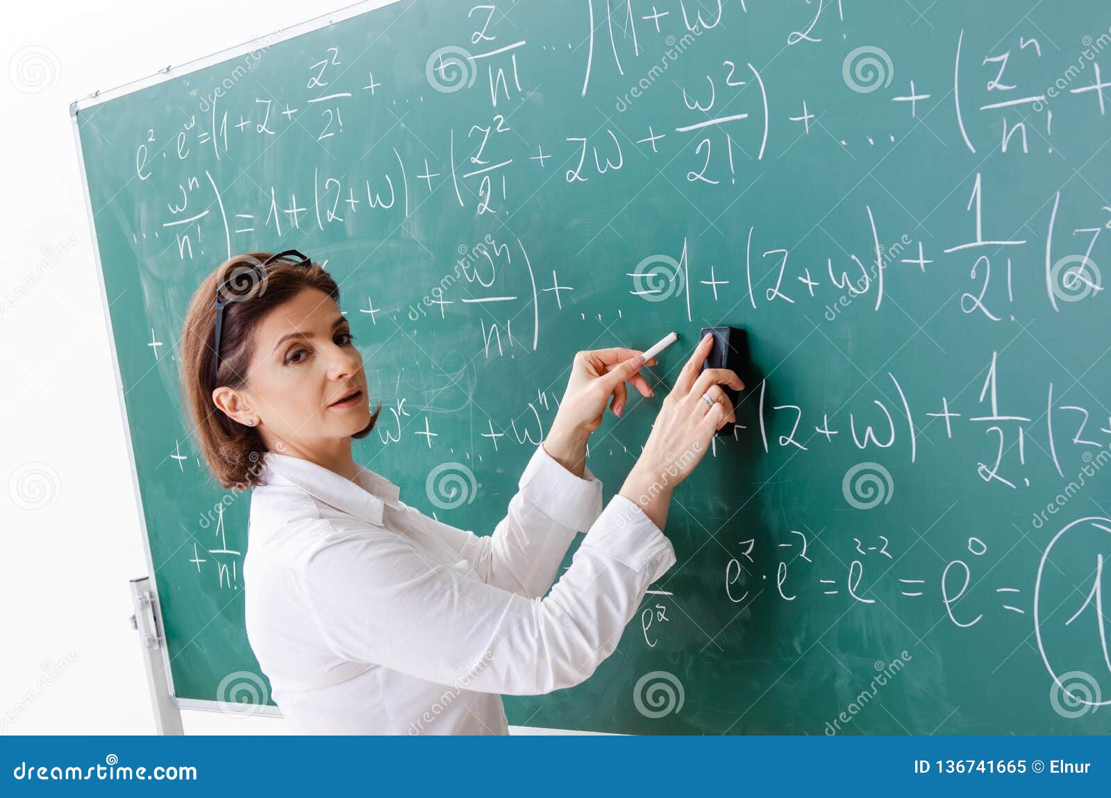 The Female Math Teacher in Front of the Chalkboard Stock Image - Image ...