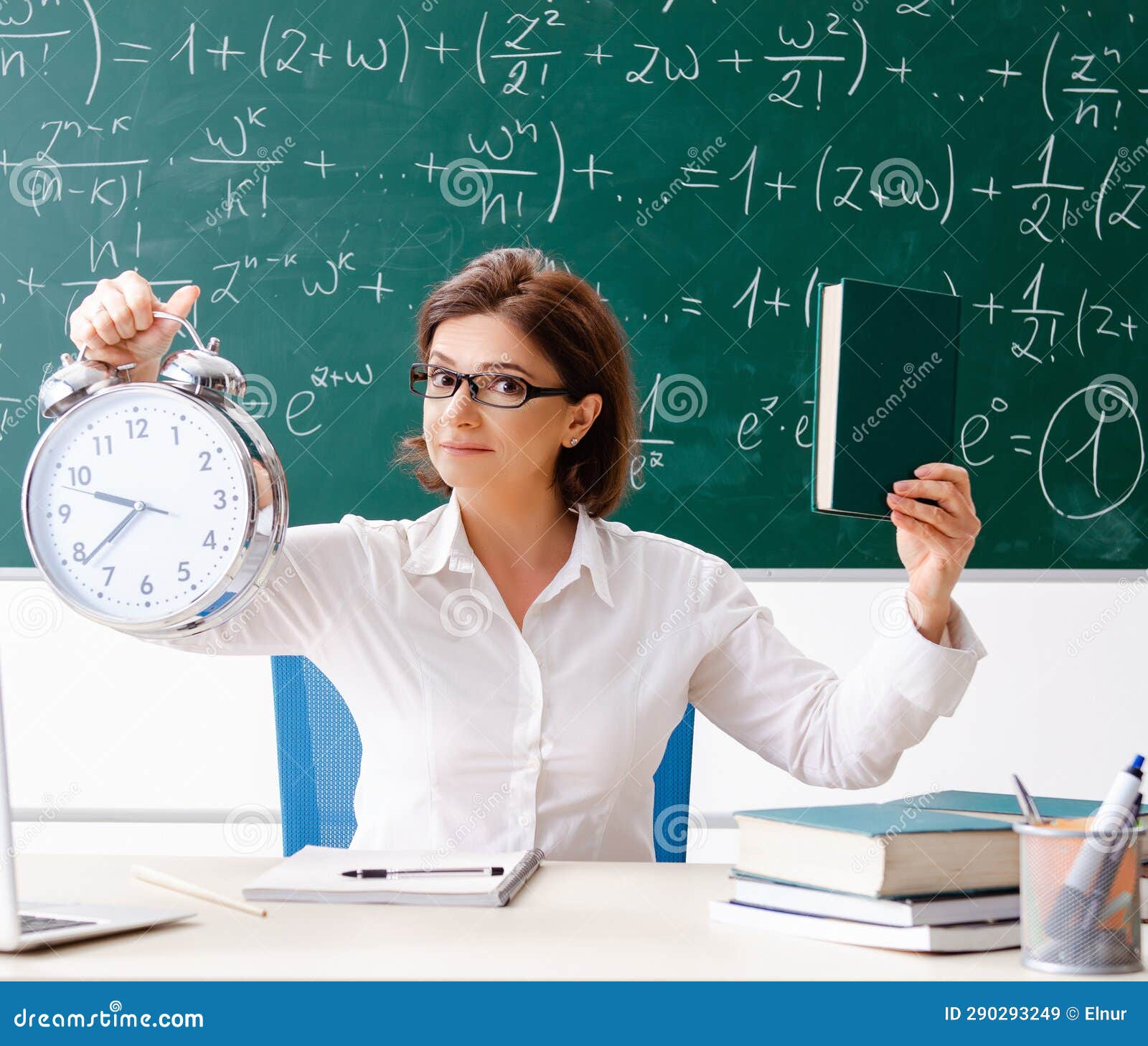 Female Math Teacher in Front of the Chalkboard Stock Image - Image of ...