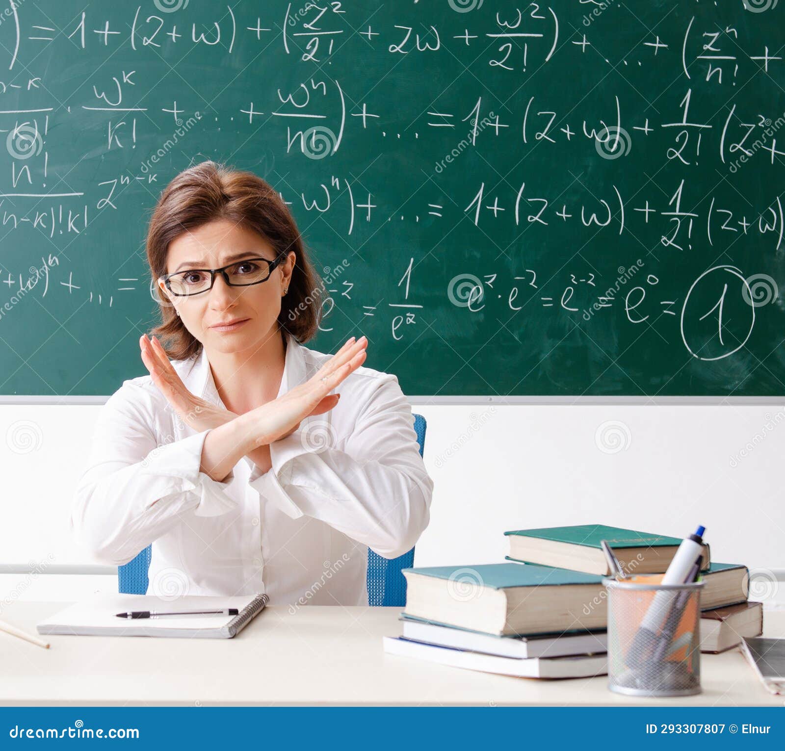 Female Math Teacher in Front of the Chalkboard Stock Image - Image of ...