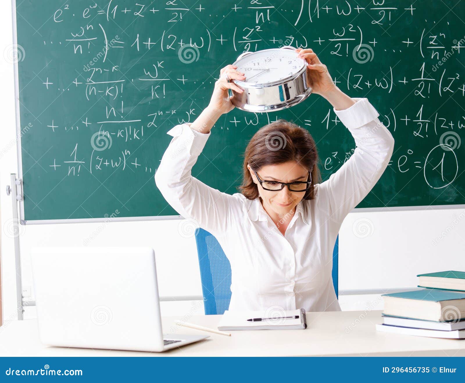 Female Math Teacher in Front of the Chalkboard Stock Image - Image of ...