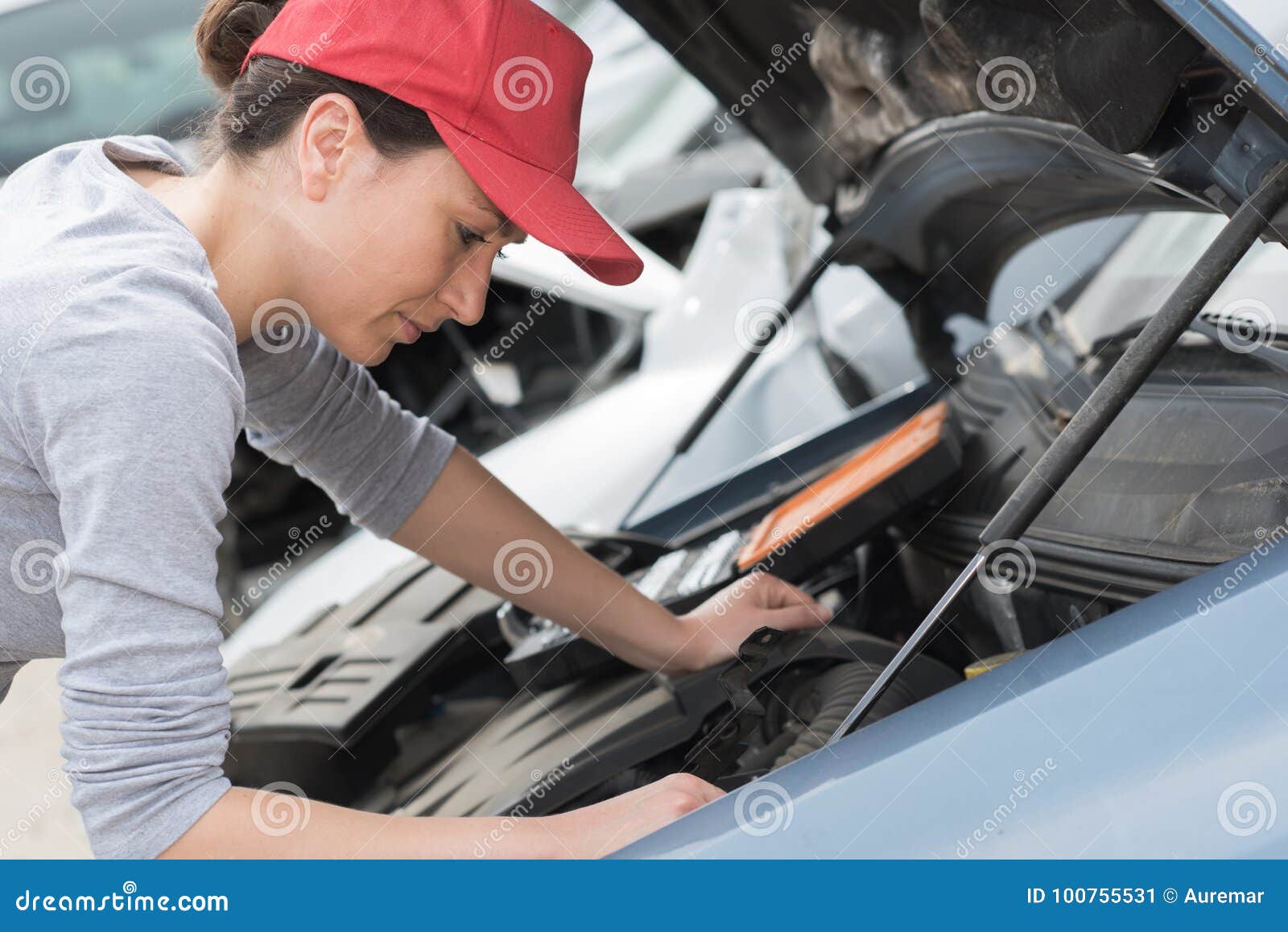 Female mechanic fixing car stock image. Image of digital - 100755531