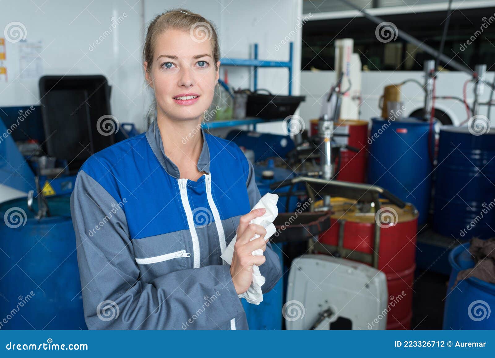 Female mechanic fixing car stock photo. Image of fixing - 223326712