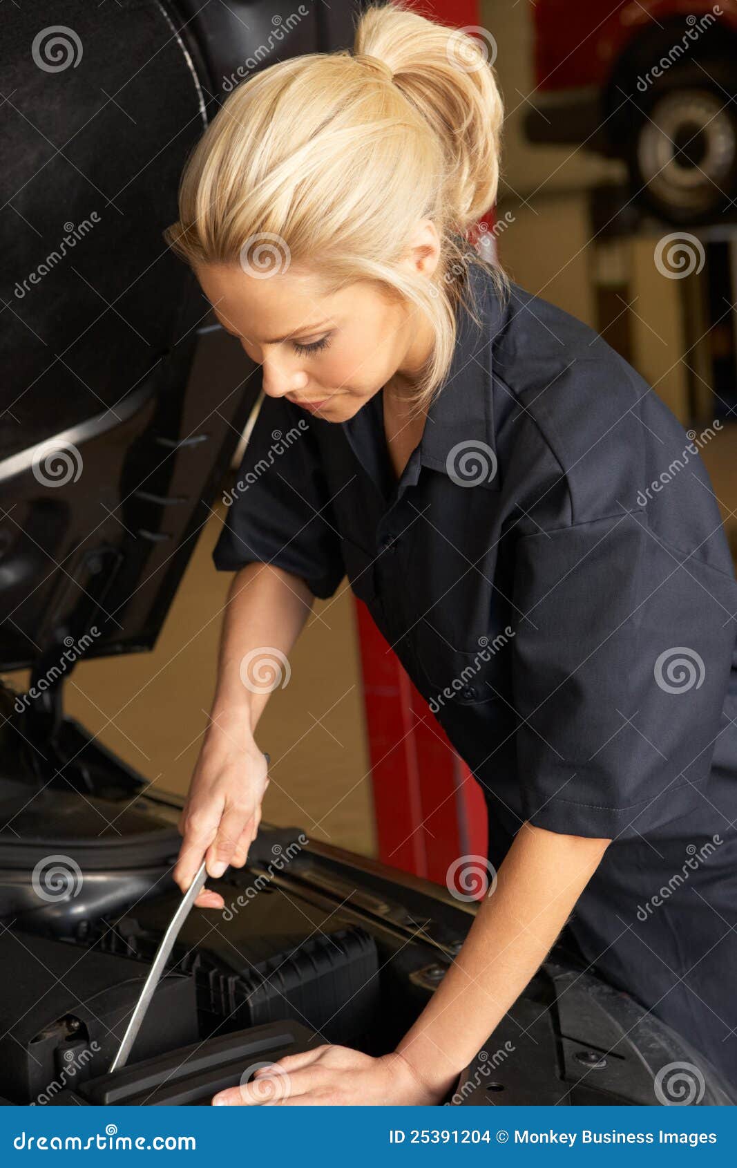 Female mechanic at work stock photo. Image of overalls - 25391204