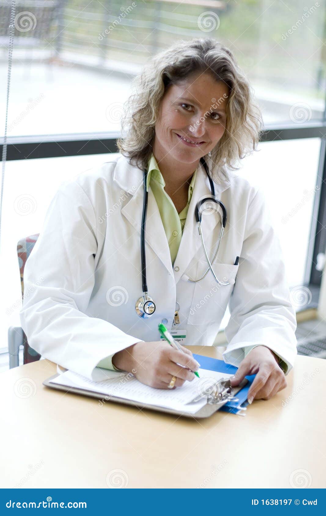 Female Medical Professional Writing Stock Image - Image of staff, nurse ...