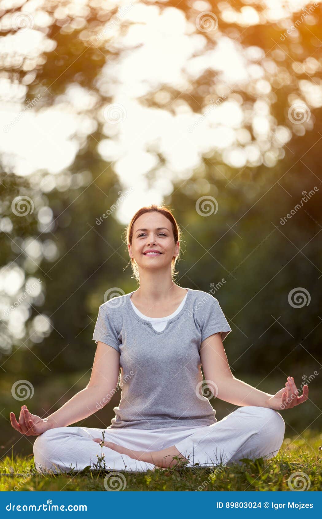 Female Meditate in Green Park Stock Photo - Image of meditate, pose ...