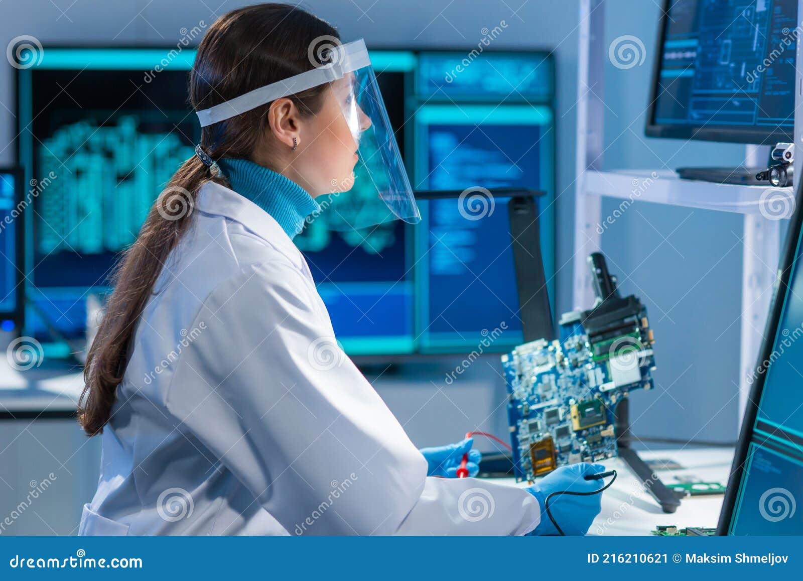 Female Microelectronics Engineer Works in a Scientific Laboratory on ...