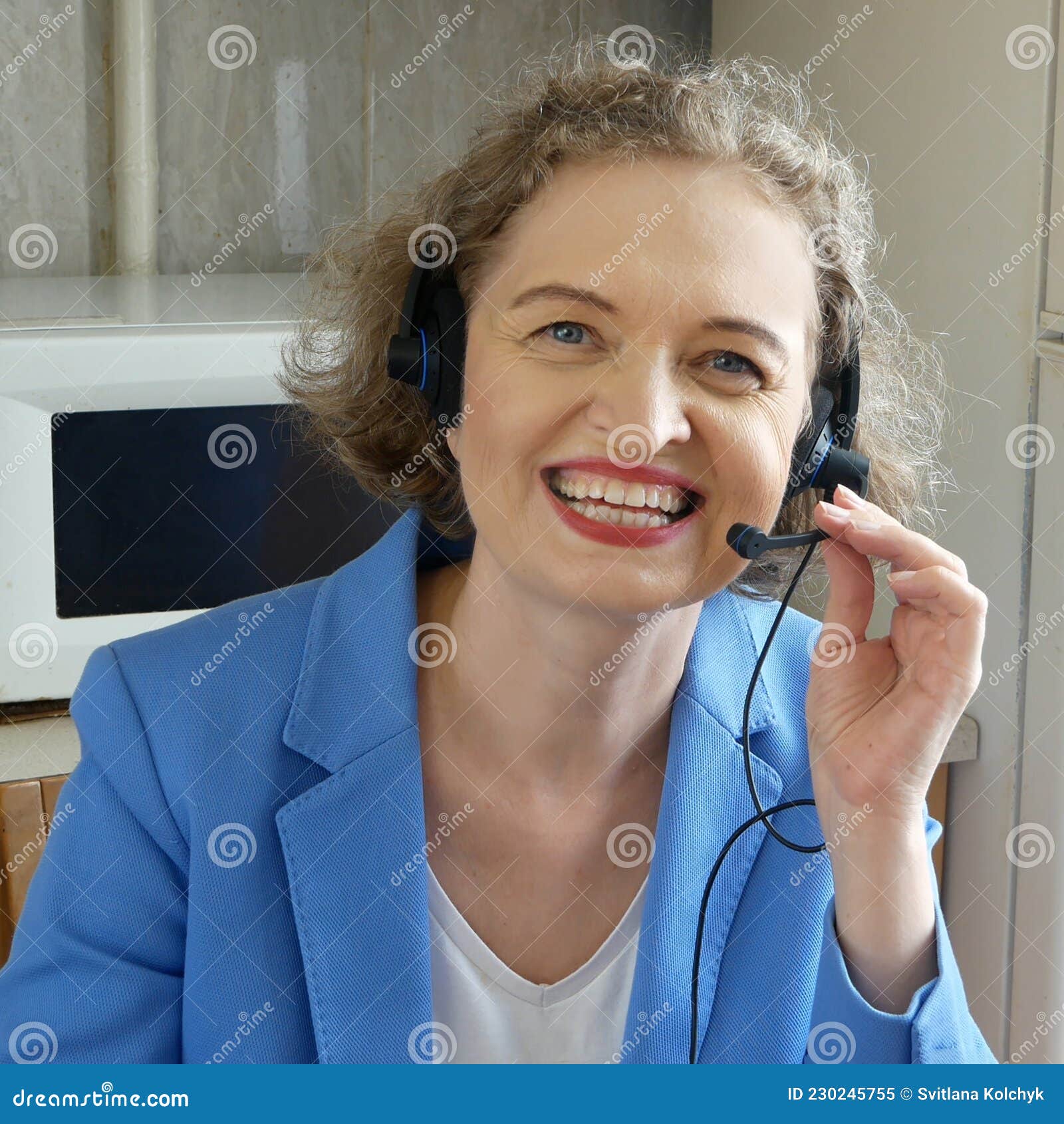 Female Middle Aged Technical Support Agent Working at Home at Kichen ...