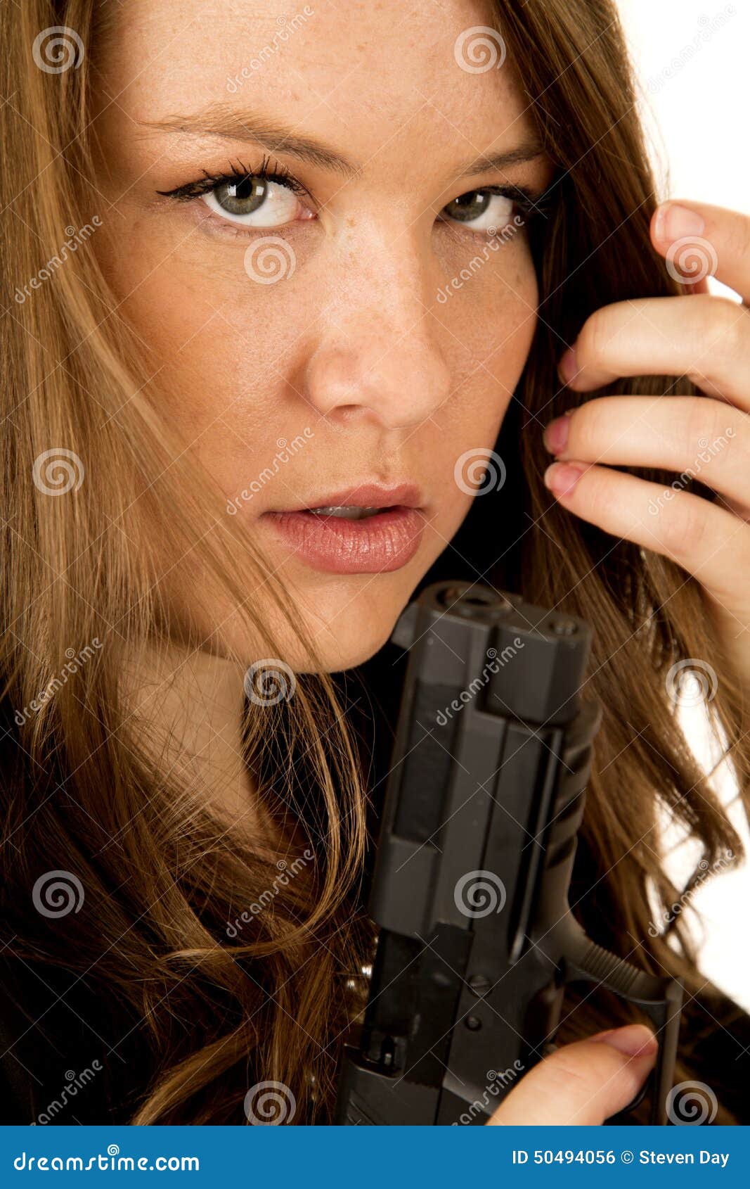Female Model Holding Pistol Close Up Serious Expression Stock Photo ...