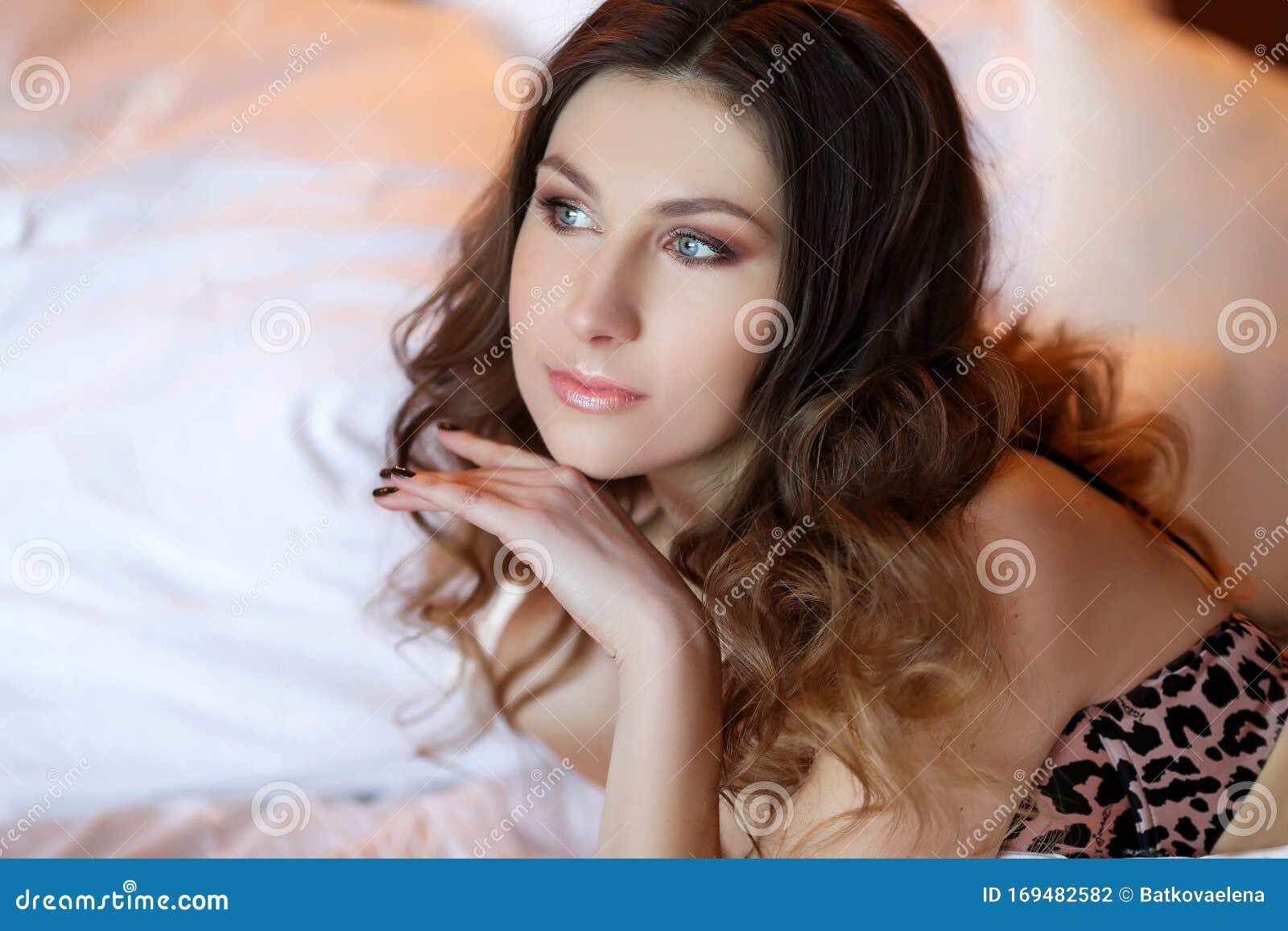 Female Model in Lingerie Lying on a White Bed Stock Photo - Image of ...