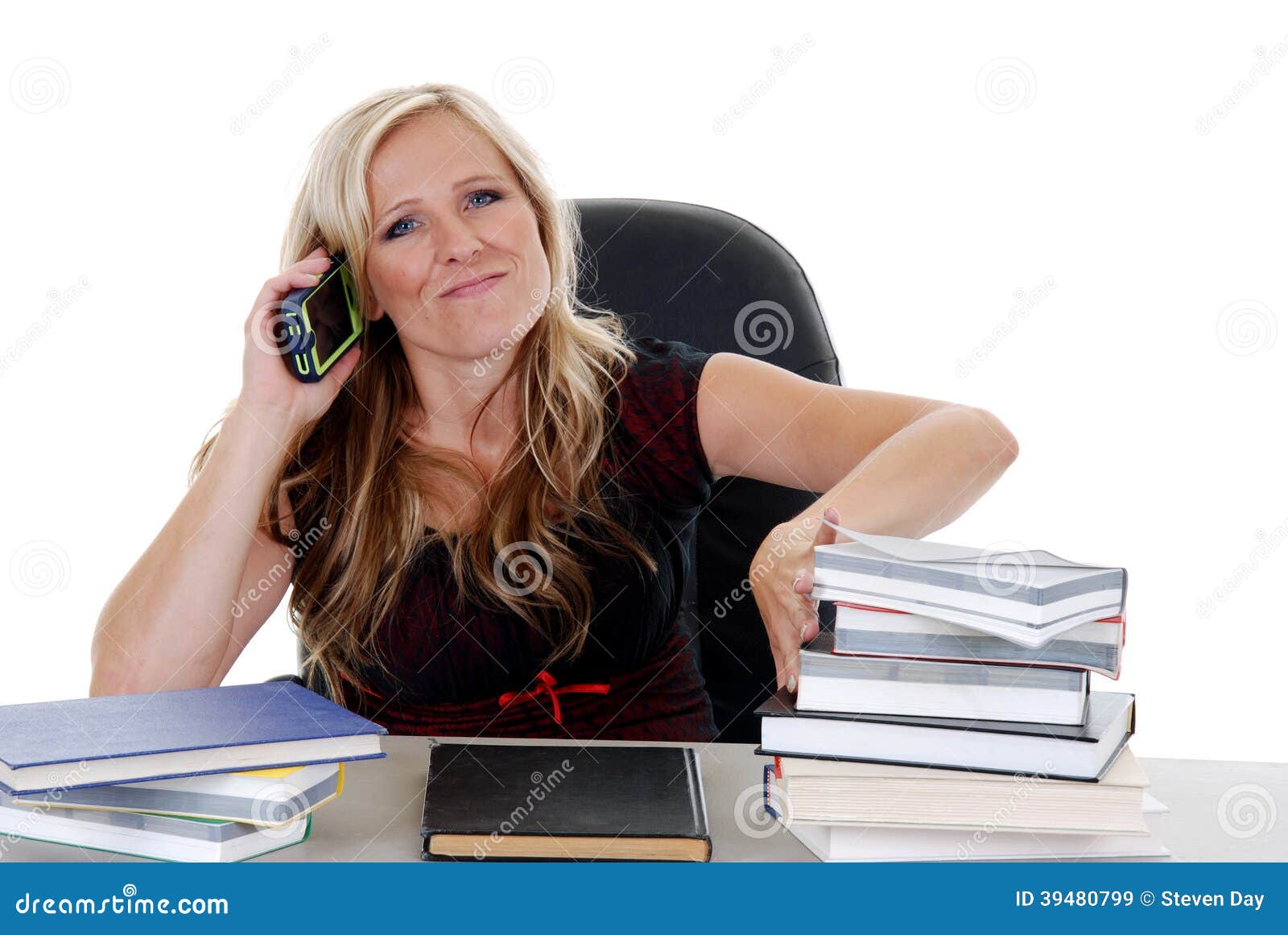 Female Model Talking on Her Cellphone Ignoring Homework Stock Image ...