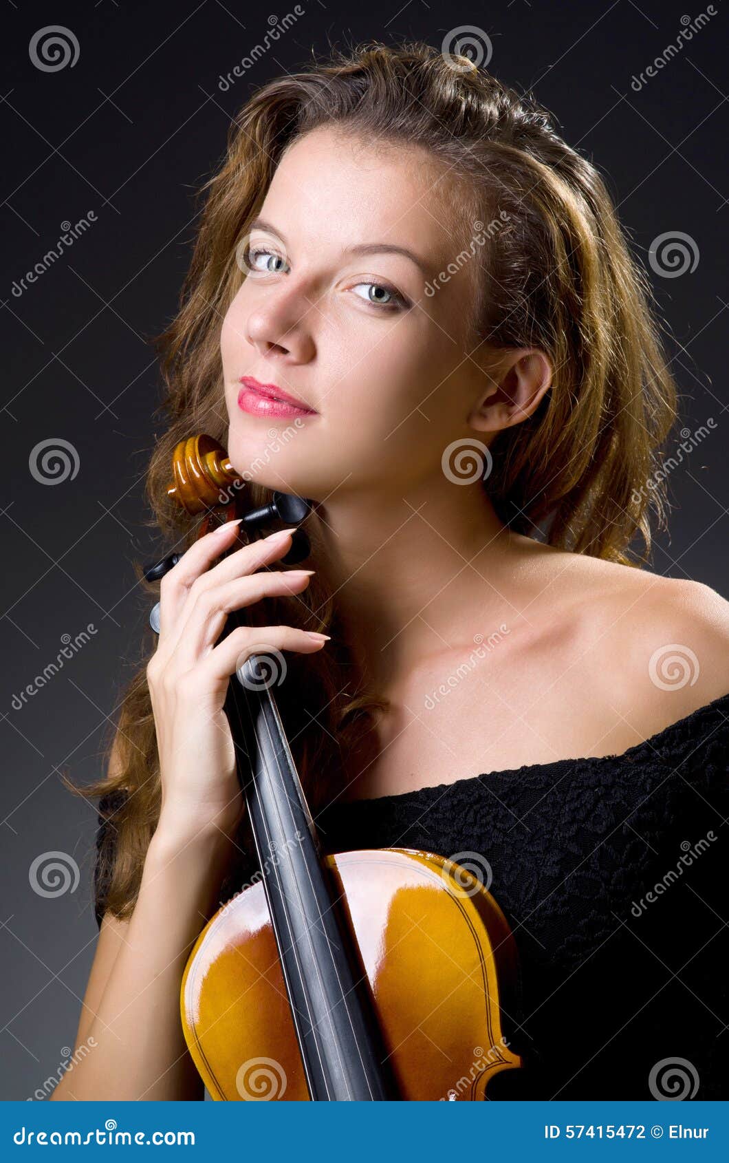 The Female Musical Player Against the Dark Stock Photo - Image of ...