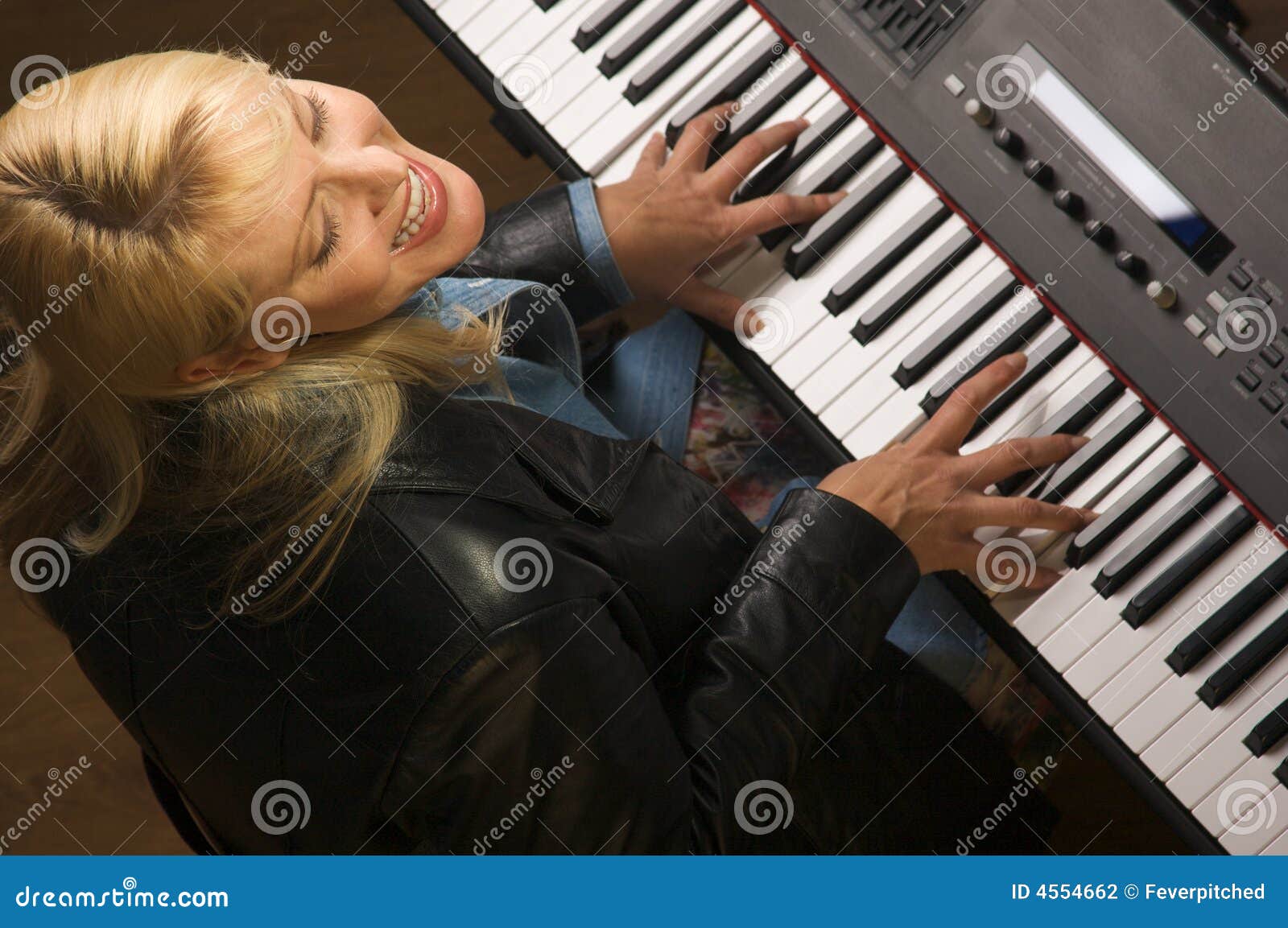 Female Musician Performs stock photo. Image of fingers - 4554662