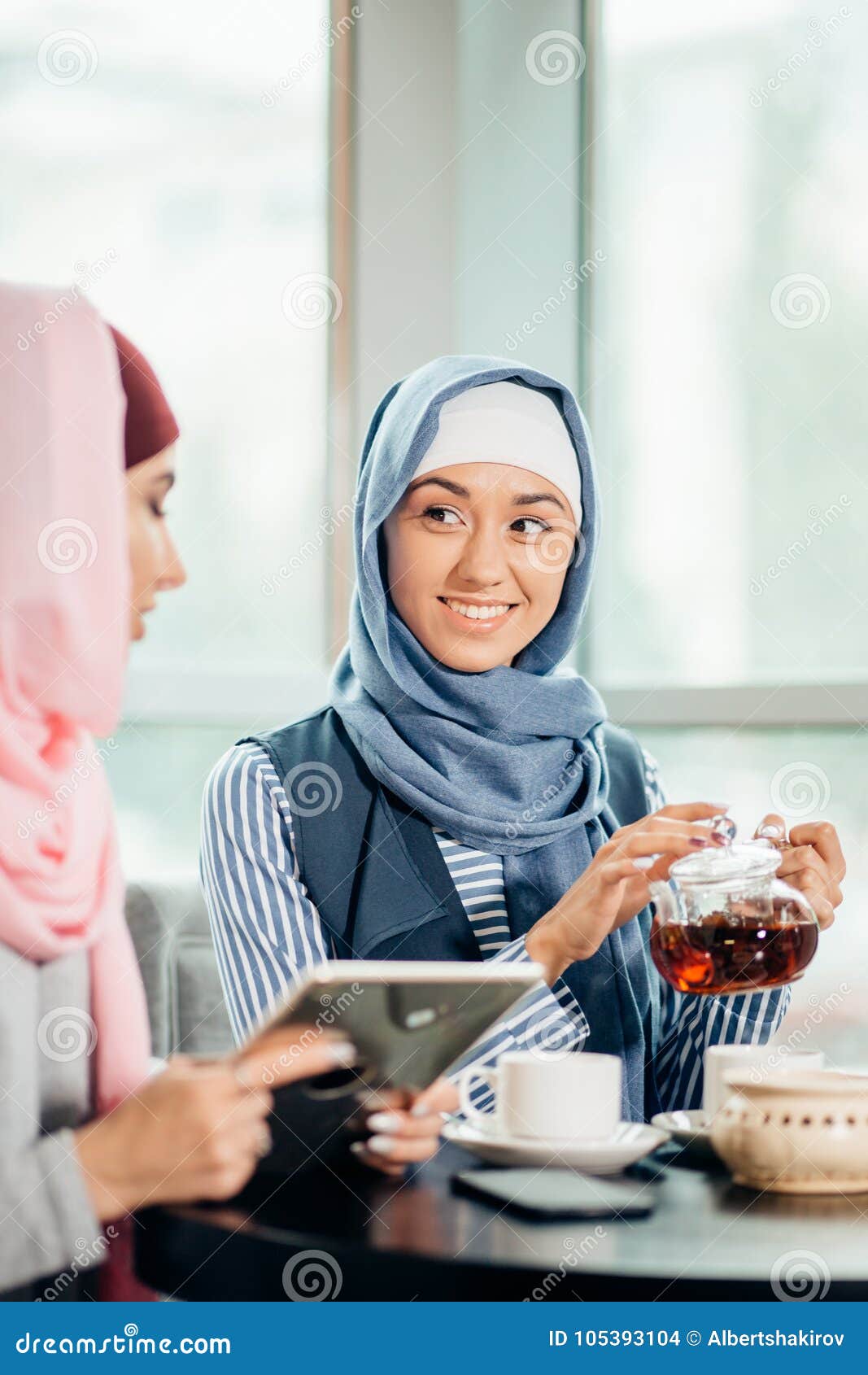 Pretty Muslim Woman Use Tablet in Cafe Stock Photo - Image of muslim ...