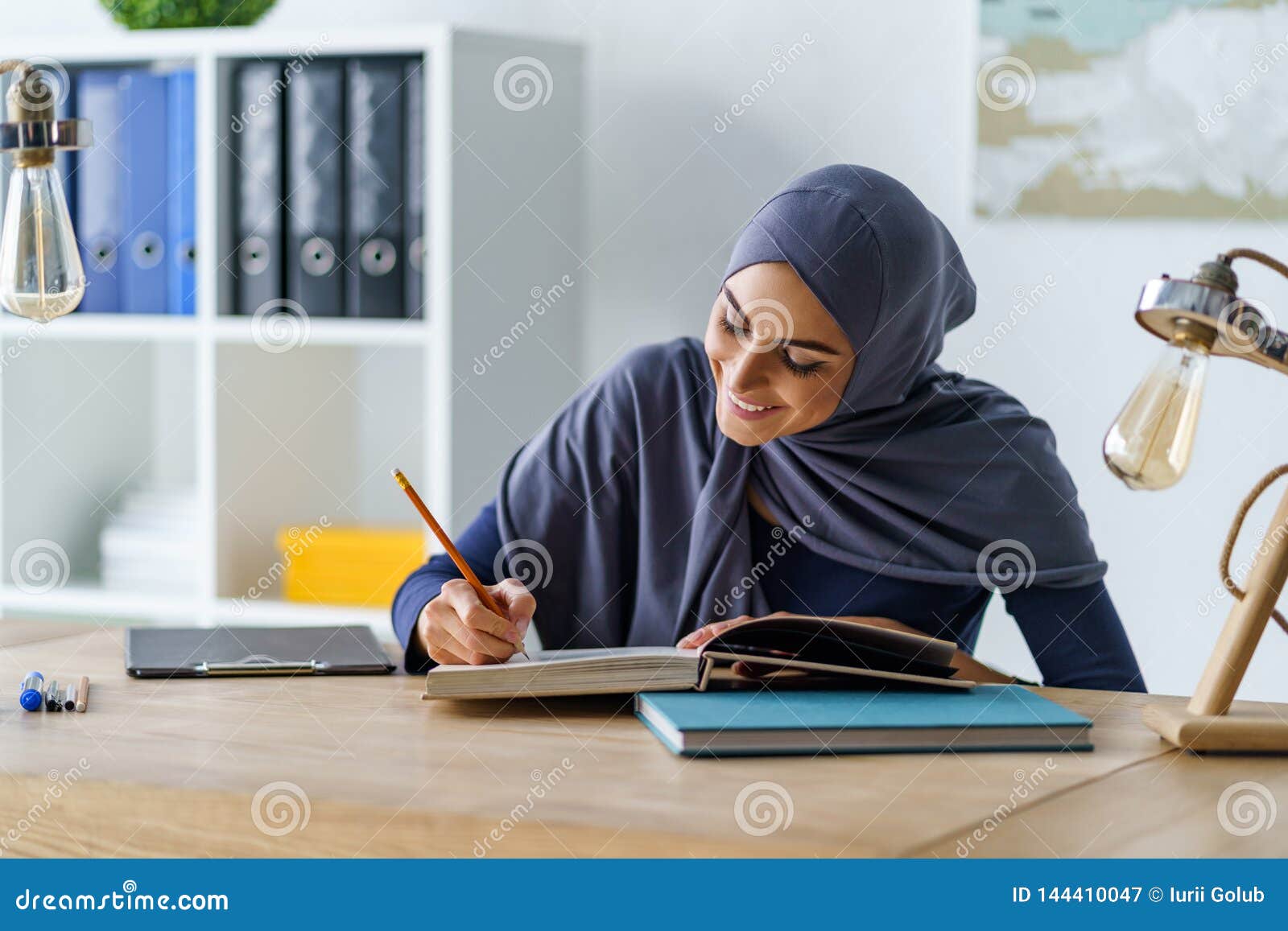 Female Muslim Student Reading Book Stock Image - Image of asian ...