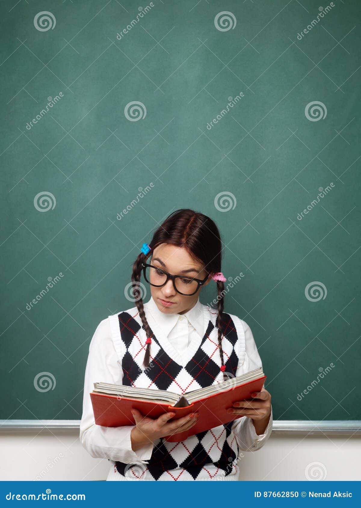 Female nerd reading book stock photo. Image of intelligence - 87662850