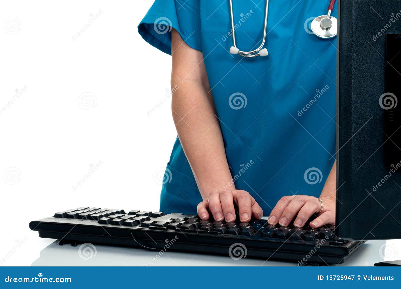 A Female Nurse/doctor Standing To Enter Data Stock Image - Image of ...