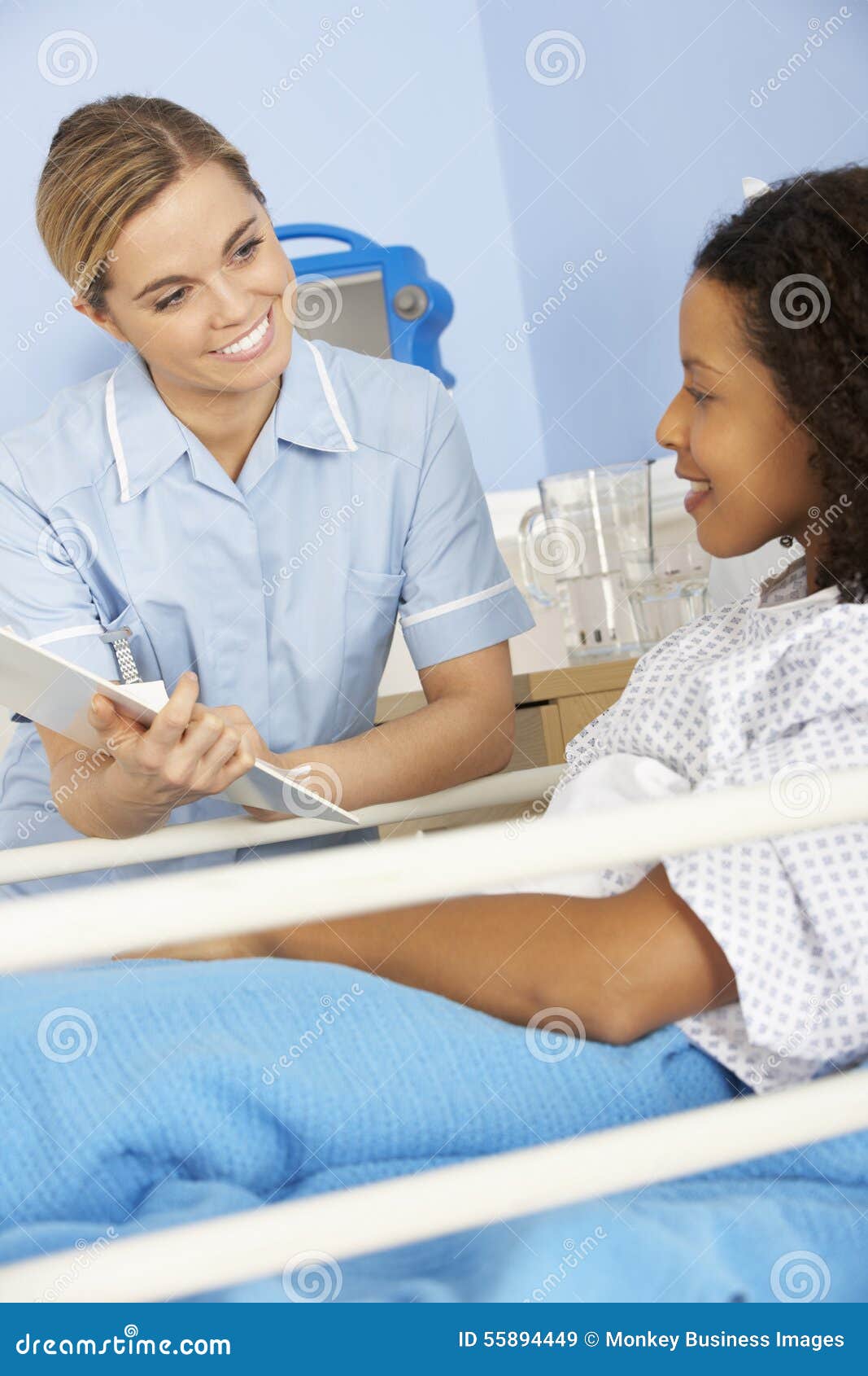 Female Nurse and Patient in Hospital Stock Image - Image of showing ...