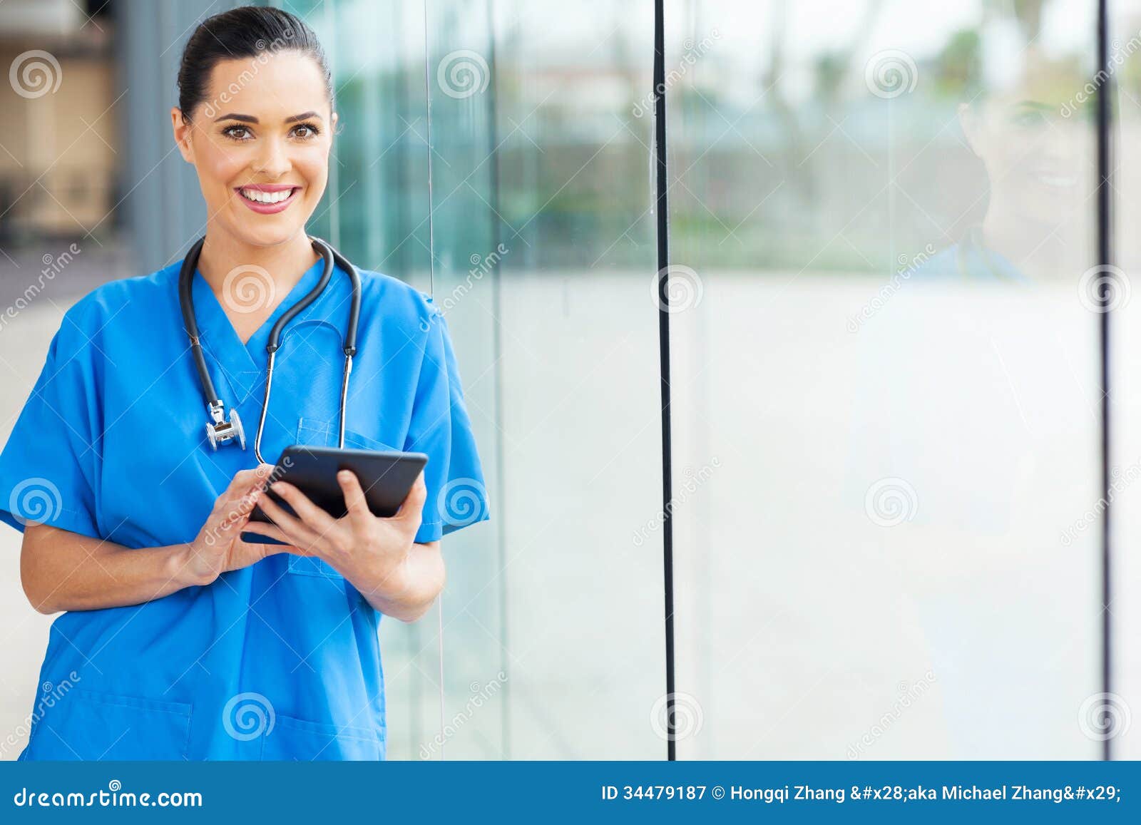 Female nurse tablet stock image. Image of adult, modern - 34479187